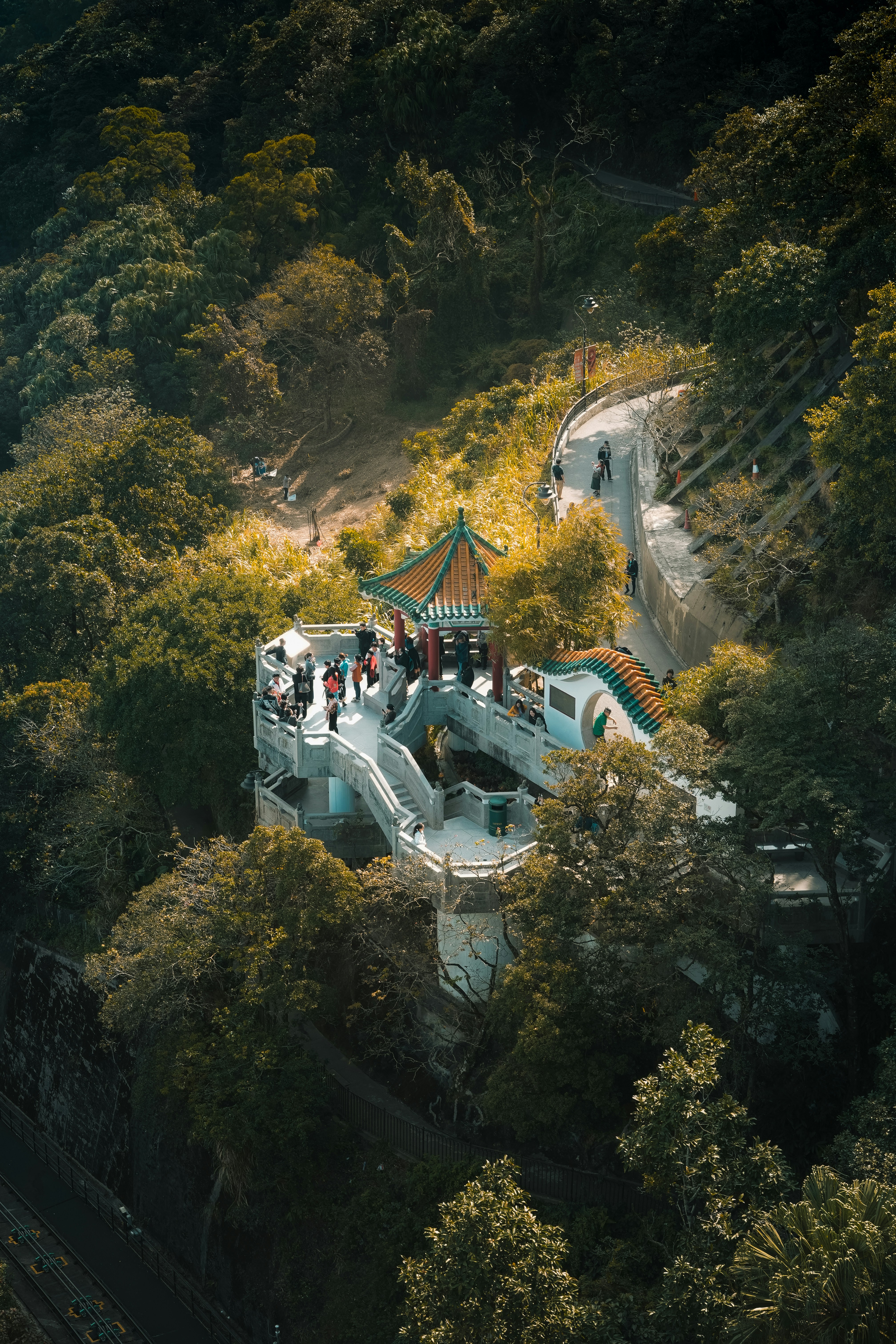 Pagoda in the Mist: A Cliffside Terrace Hidden Among Autumn Trees