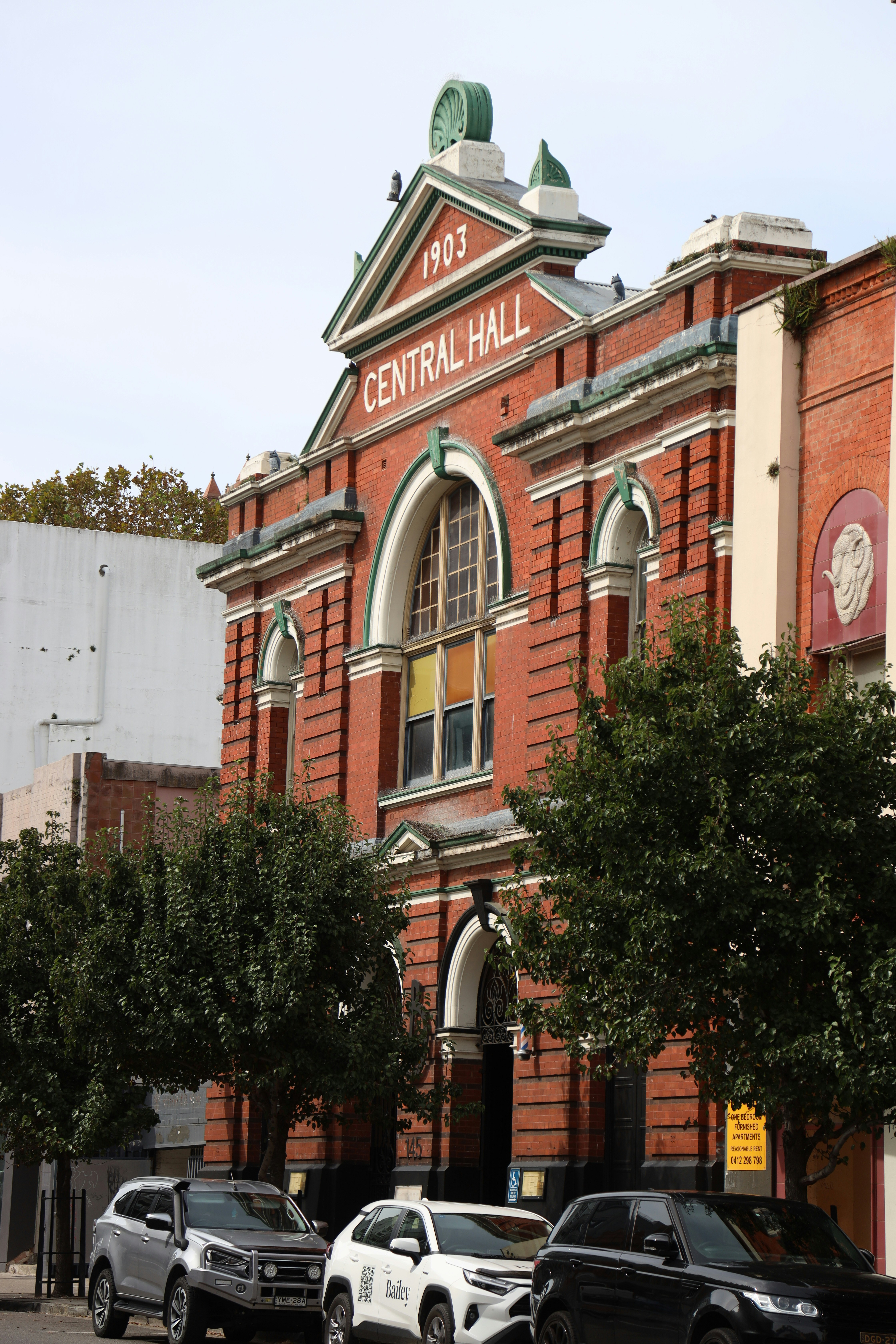 Central Hall’s Brick Facade: A Street-Level Portrait of Historic Architecture