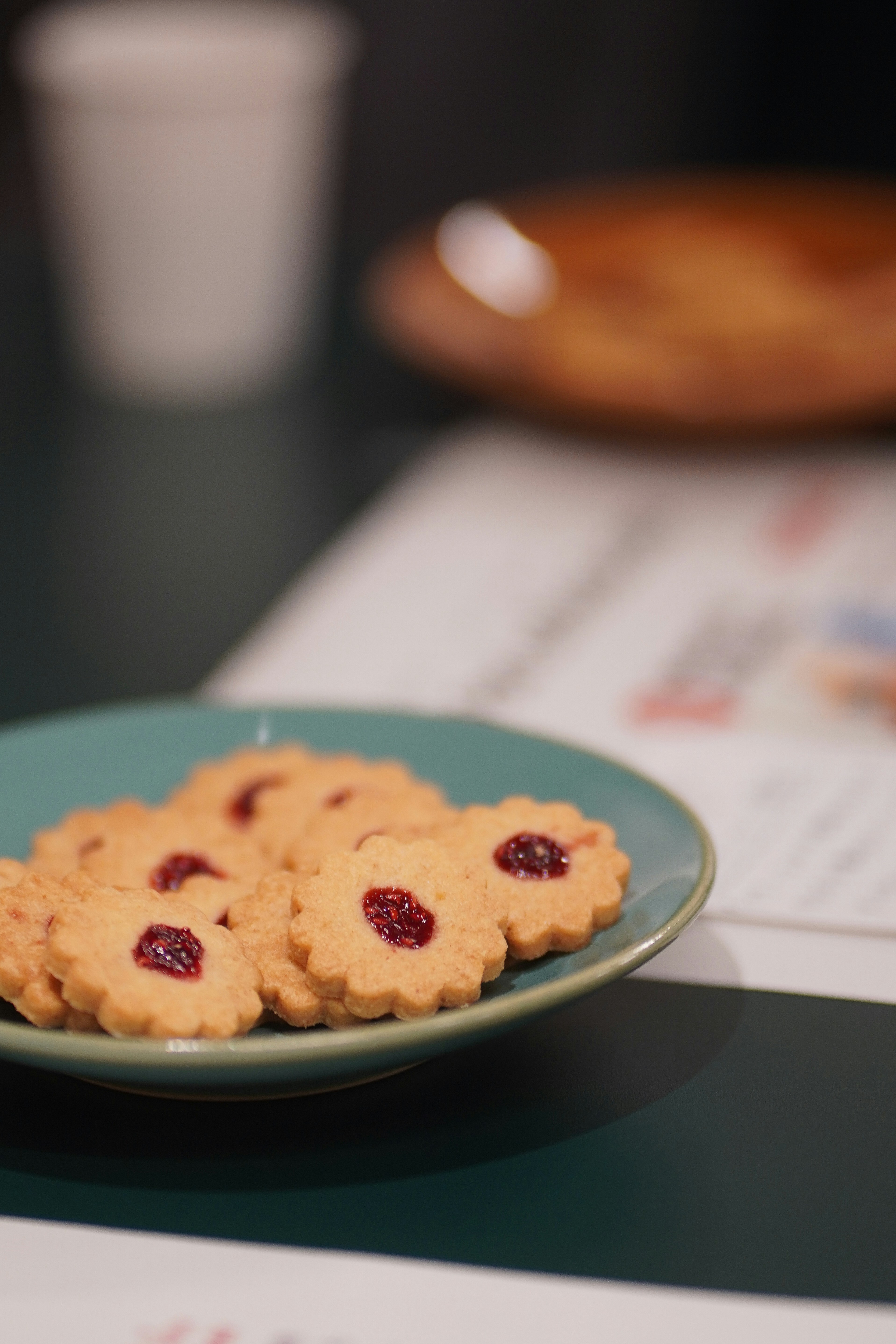 Plate of Thumbprint Jam Cookies in Focused Afternoon Scene
