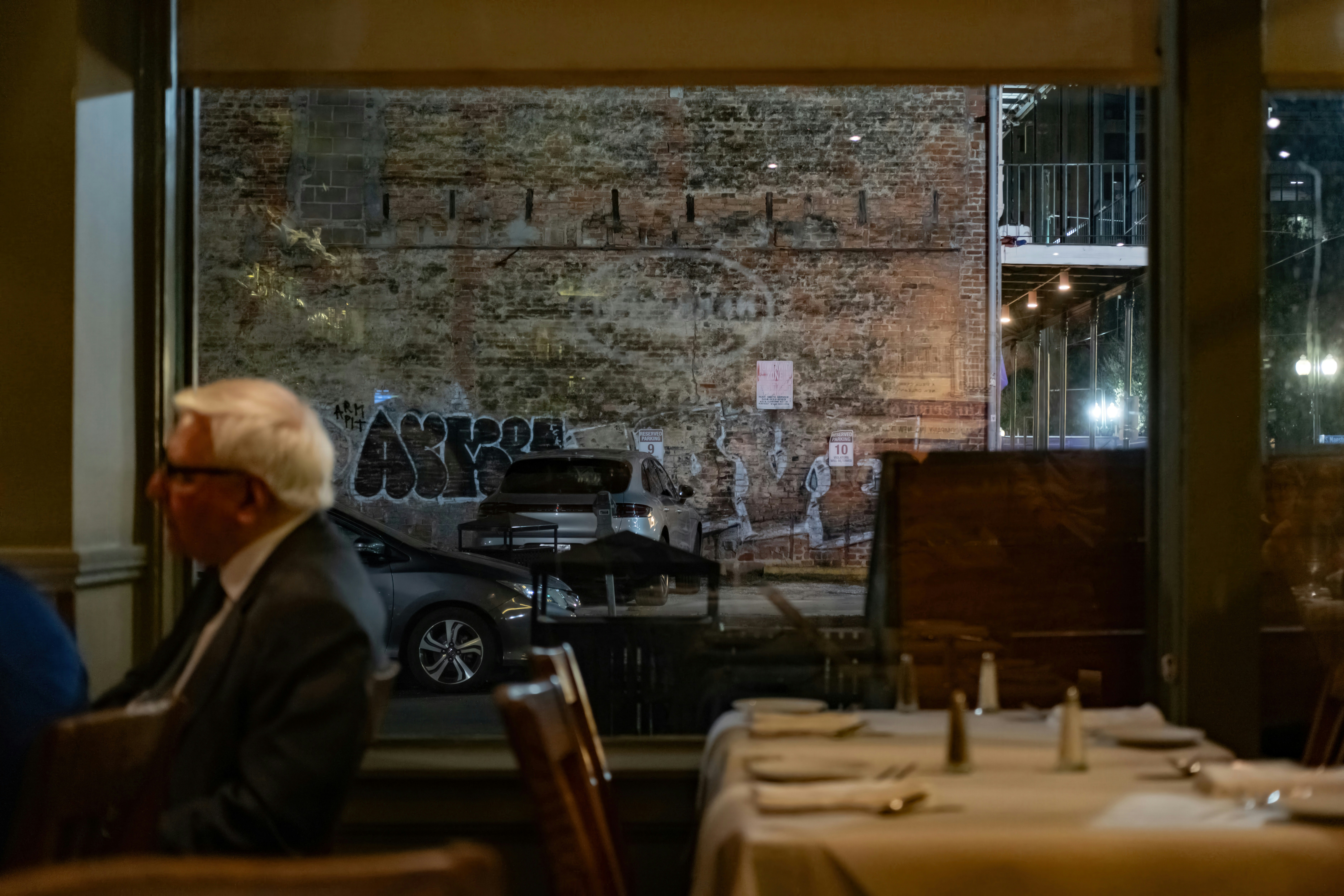 Quiet Dining Room Closes In on the Street Edge