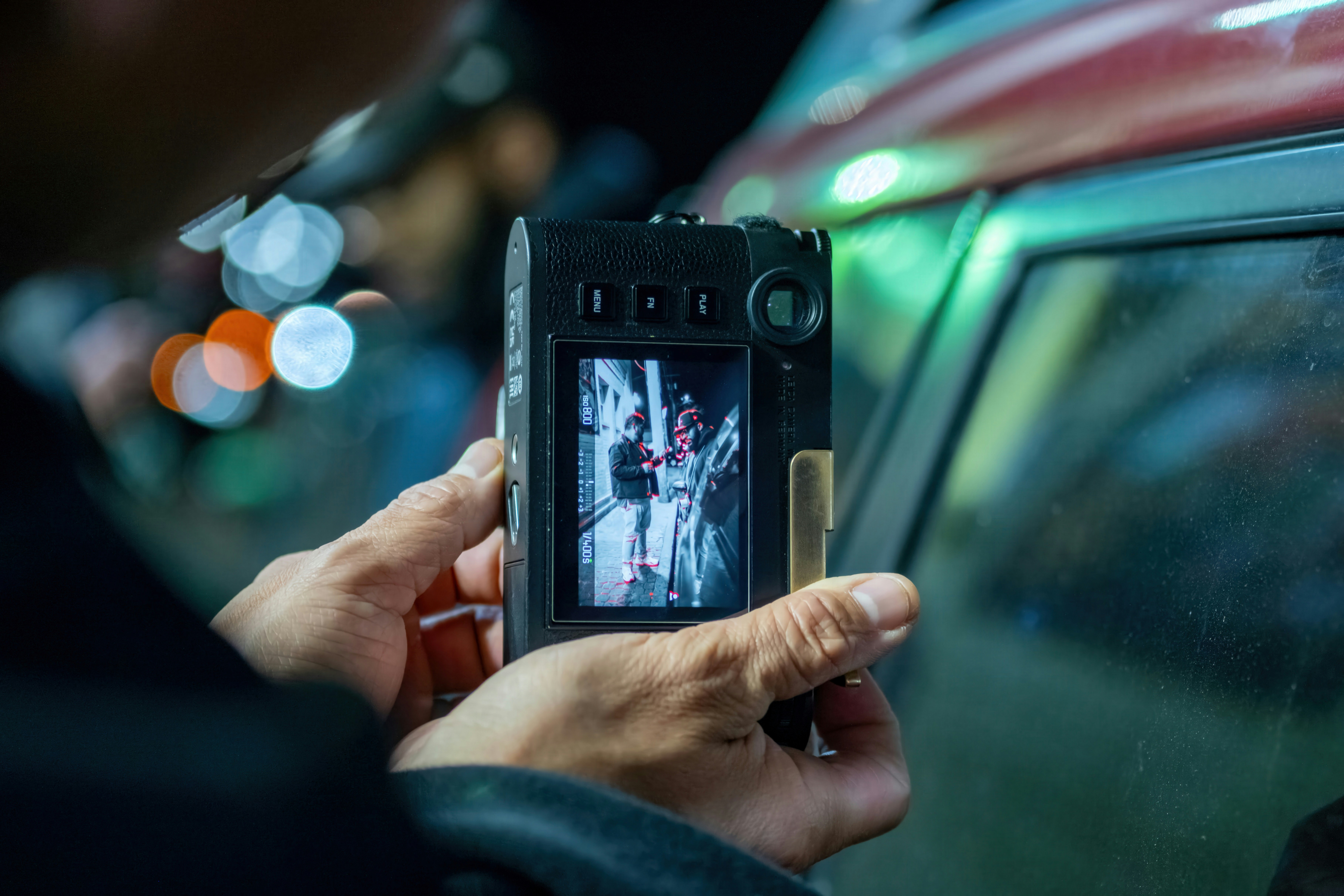 In the Grip of a Night Shoot: Framed by a Handheld Viewfinder