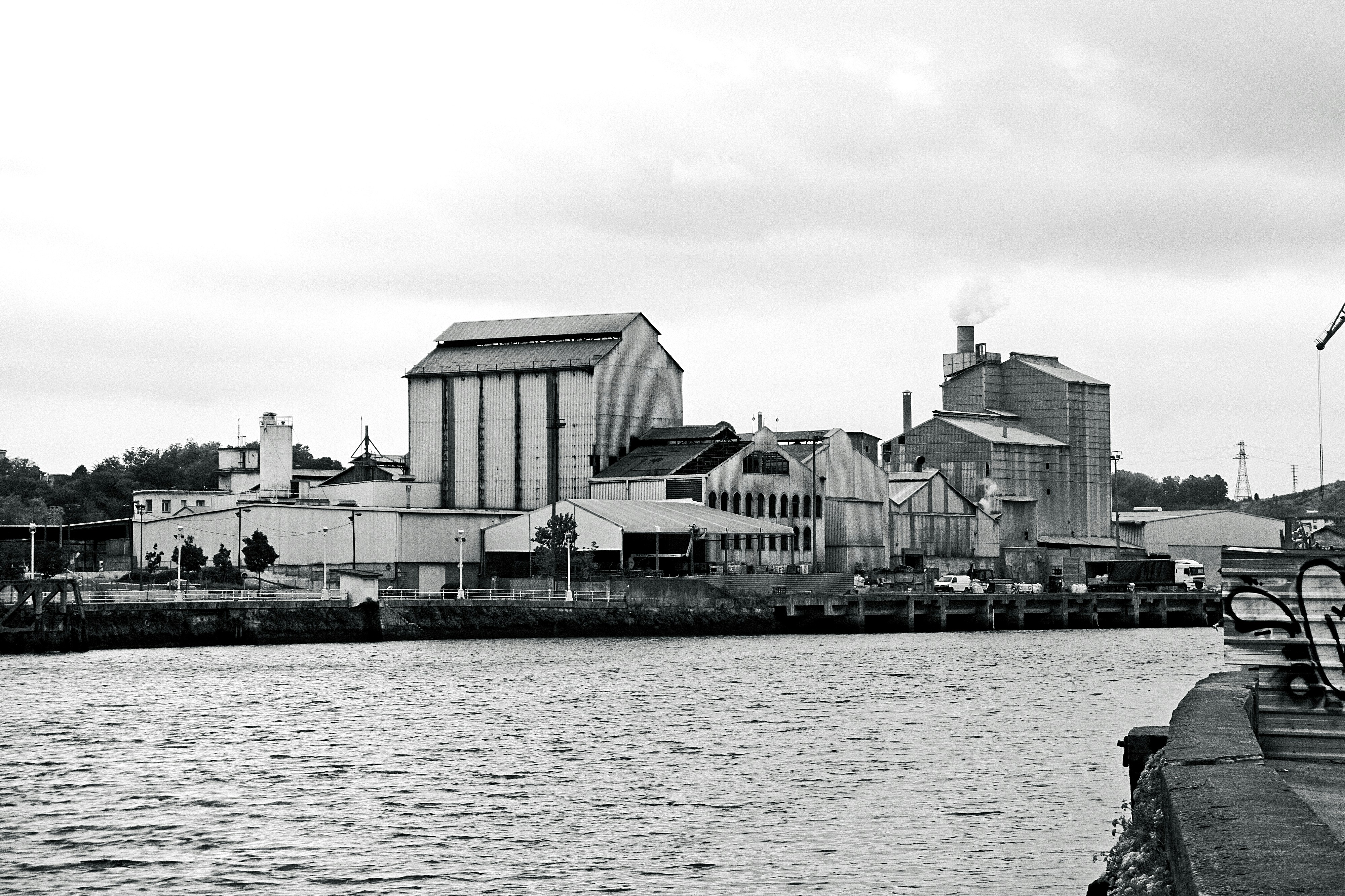 Harbor Industrial Silhouette: A Monochrome Dockfront