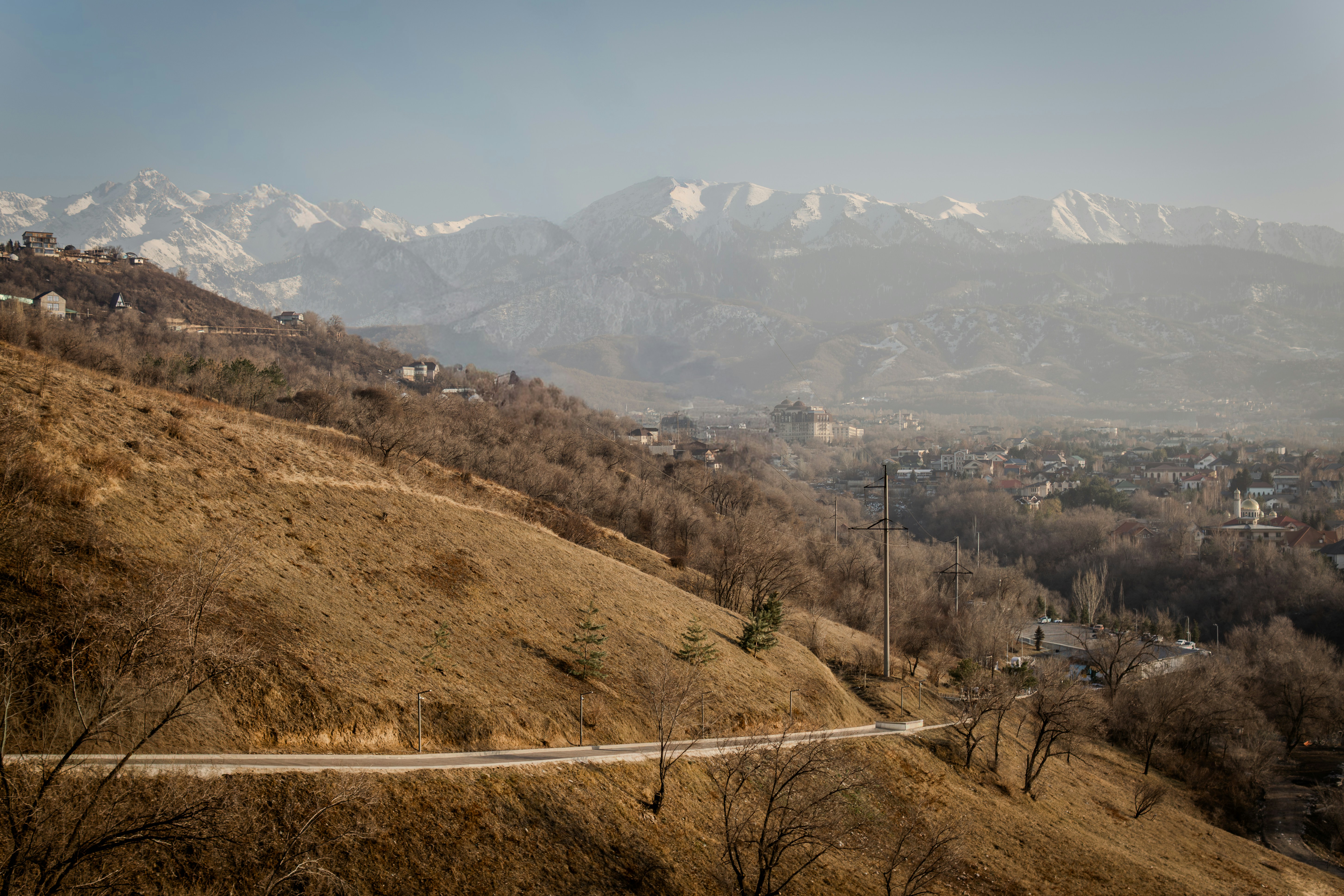Horizon Highway through Winter Hills toward Snowcapped Range
