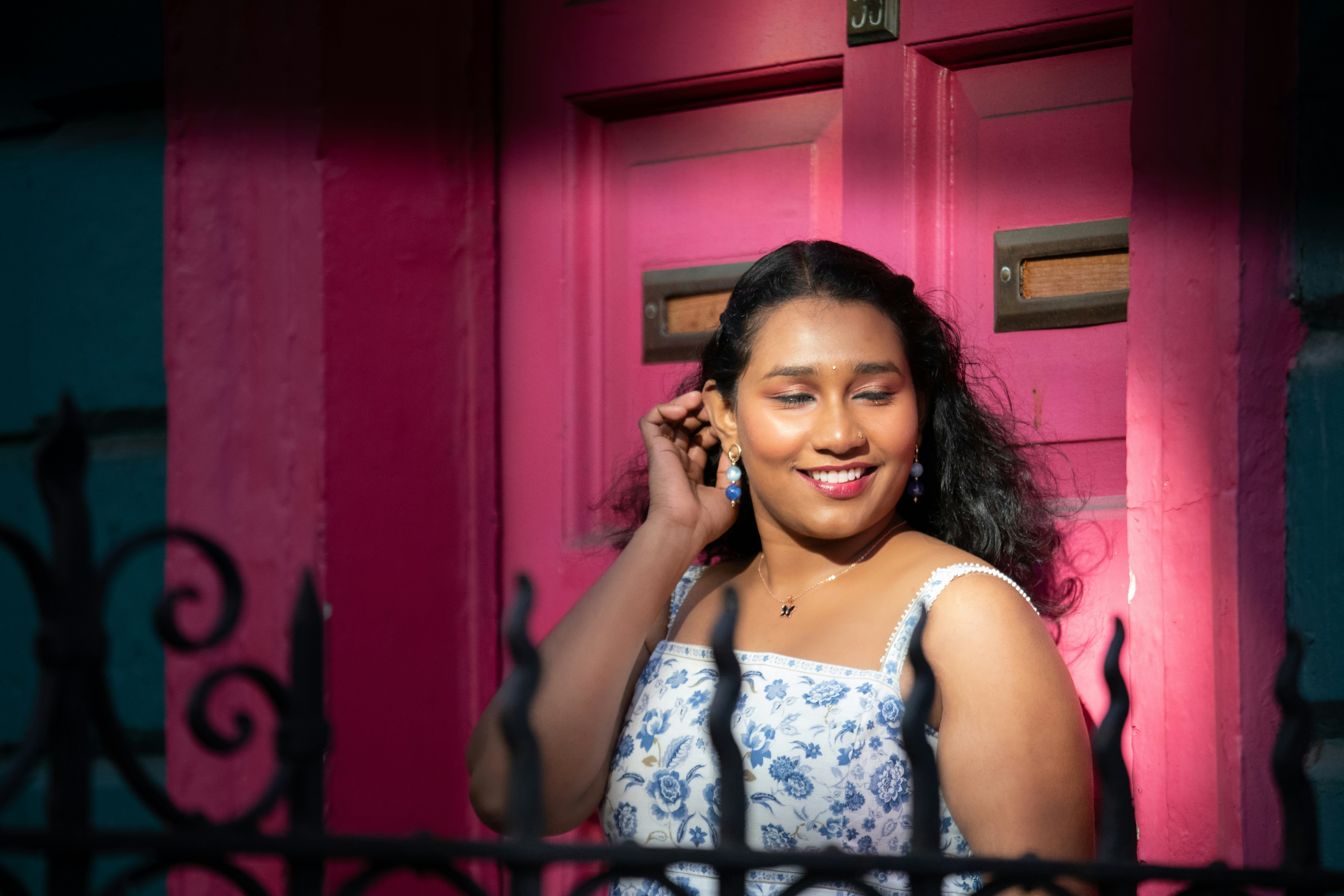 Sunlit Portrait on a Fuchsia Doorstep