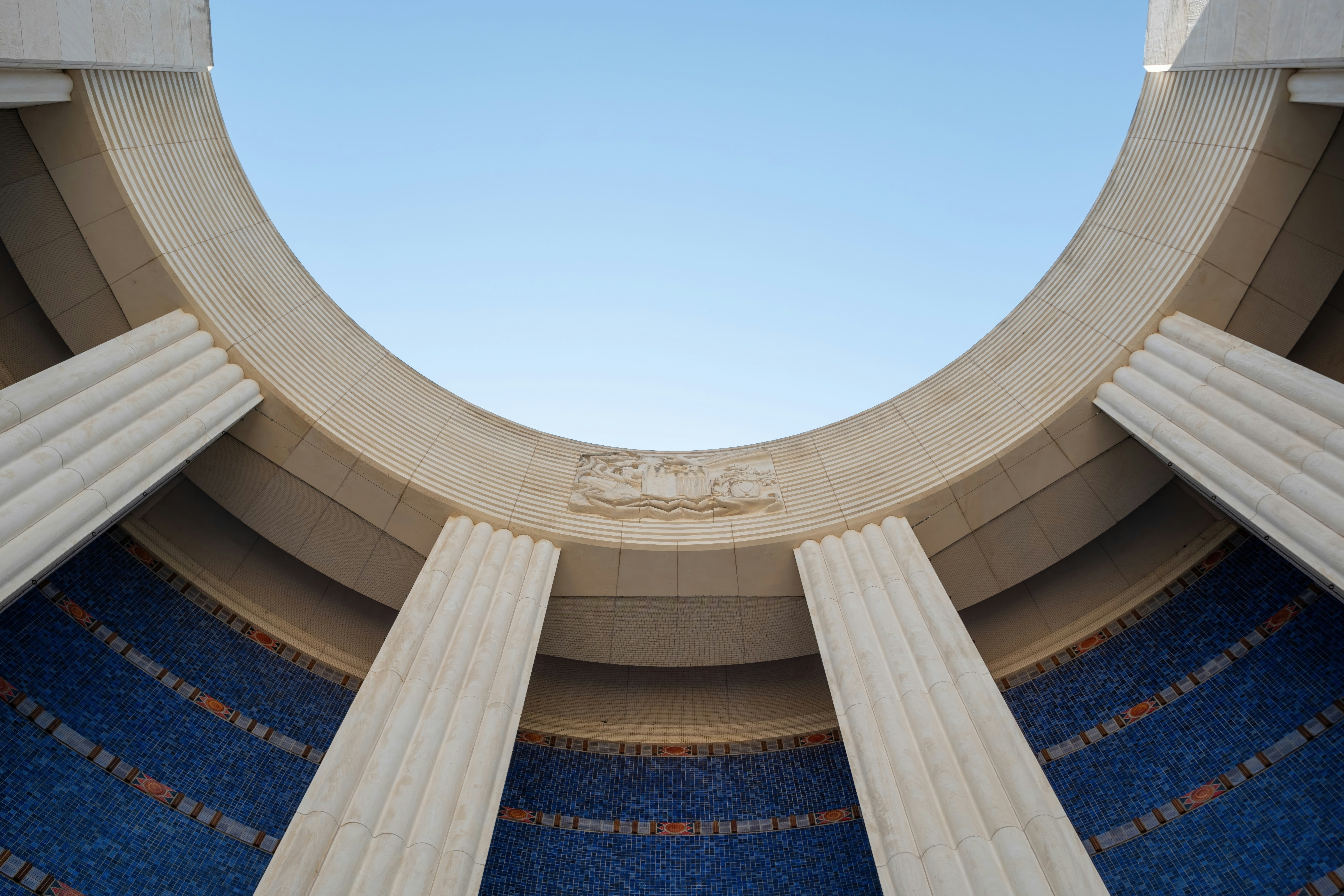 Circular Portal: A Ring of Columns Framing a Clear Sky