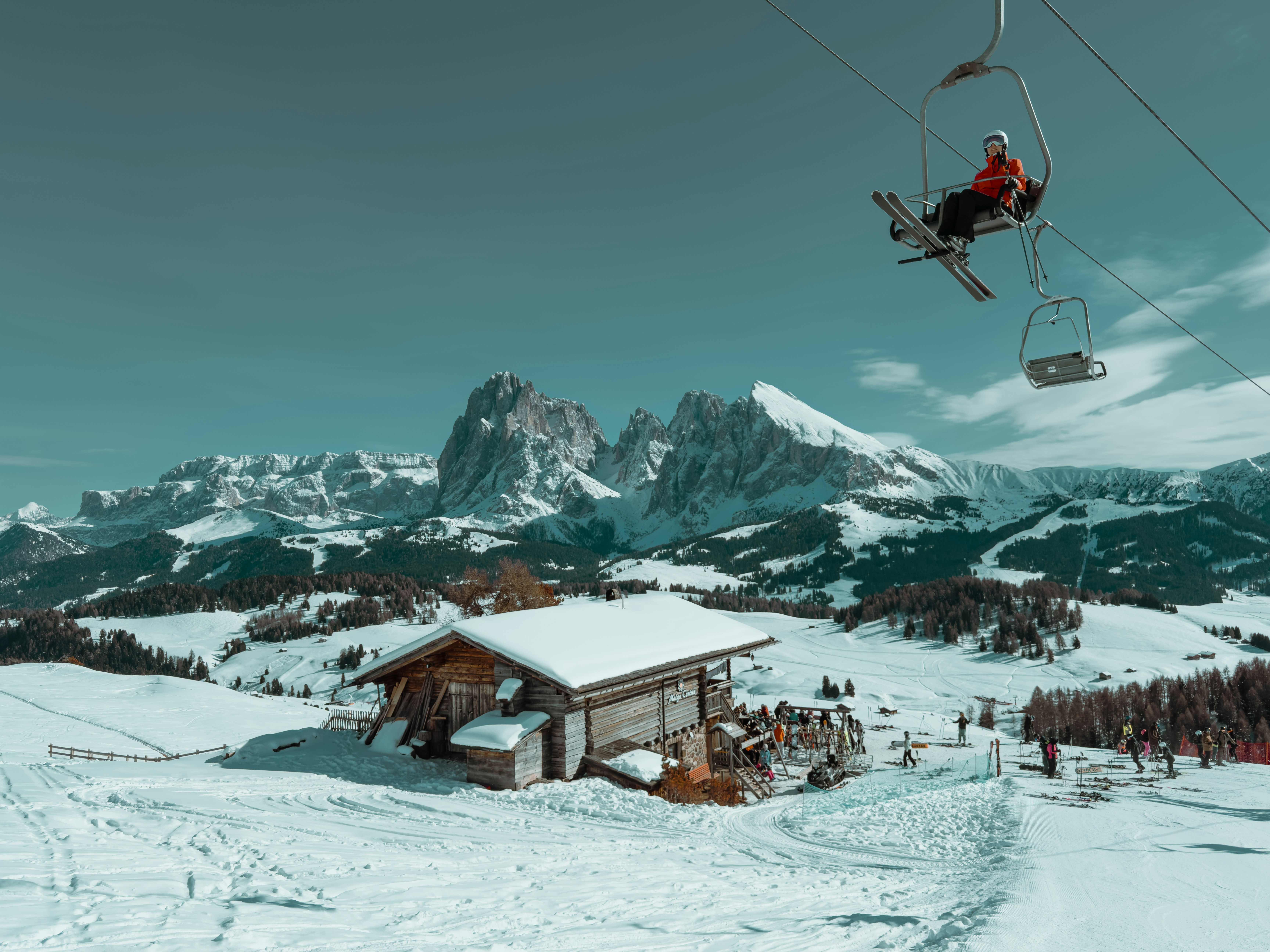 Lifted in Snow: Alpine Lifters Above a Rustic Chalet