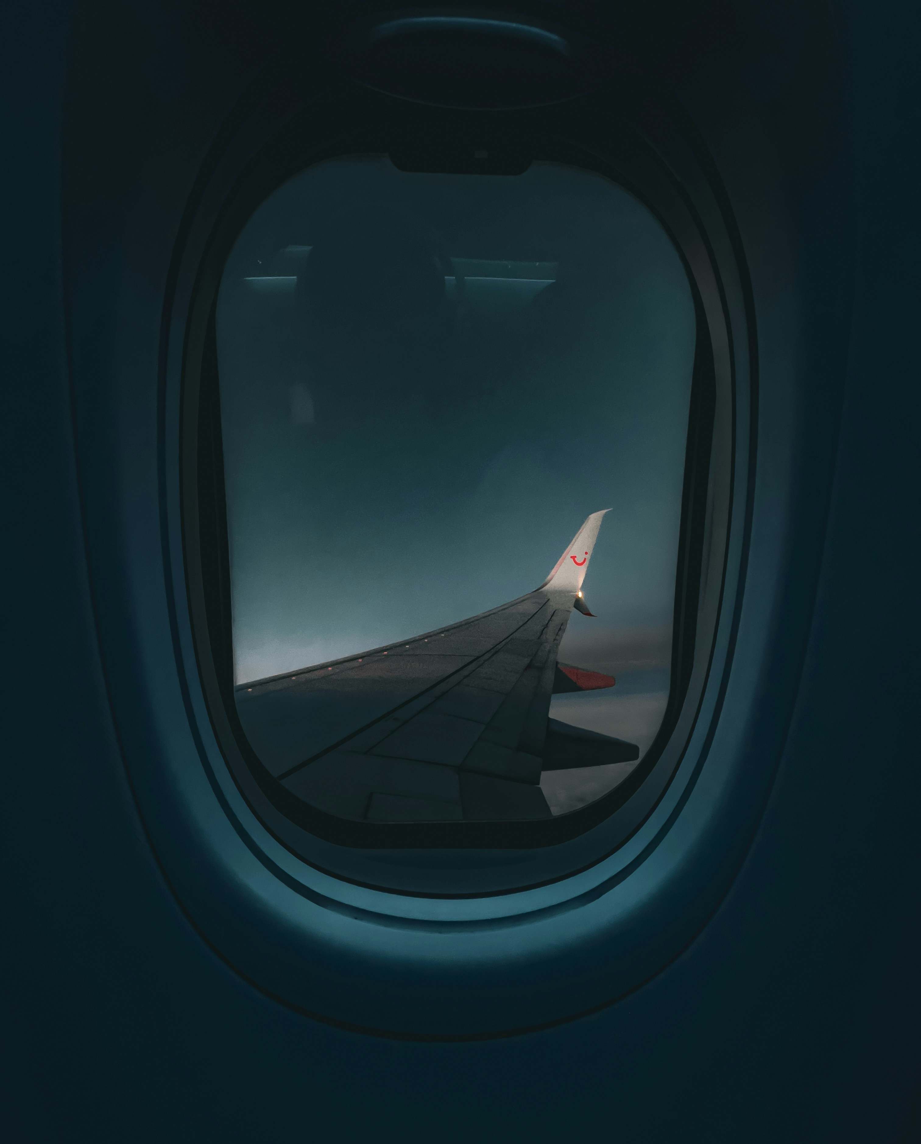 Wingtip Light: Quiet Sky through the Airplane Window
