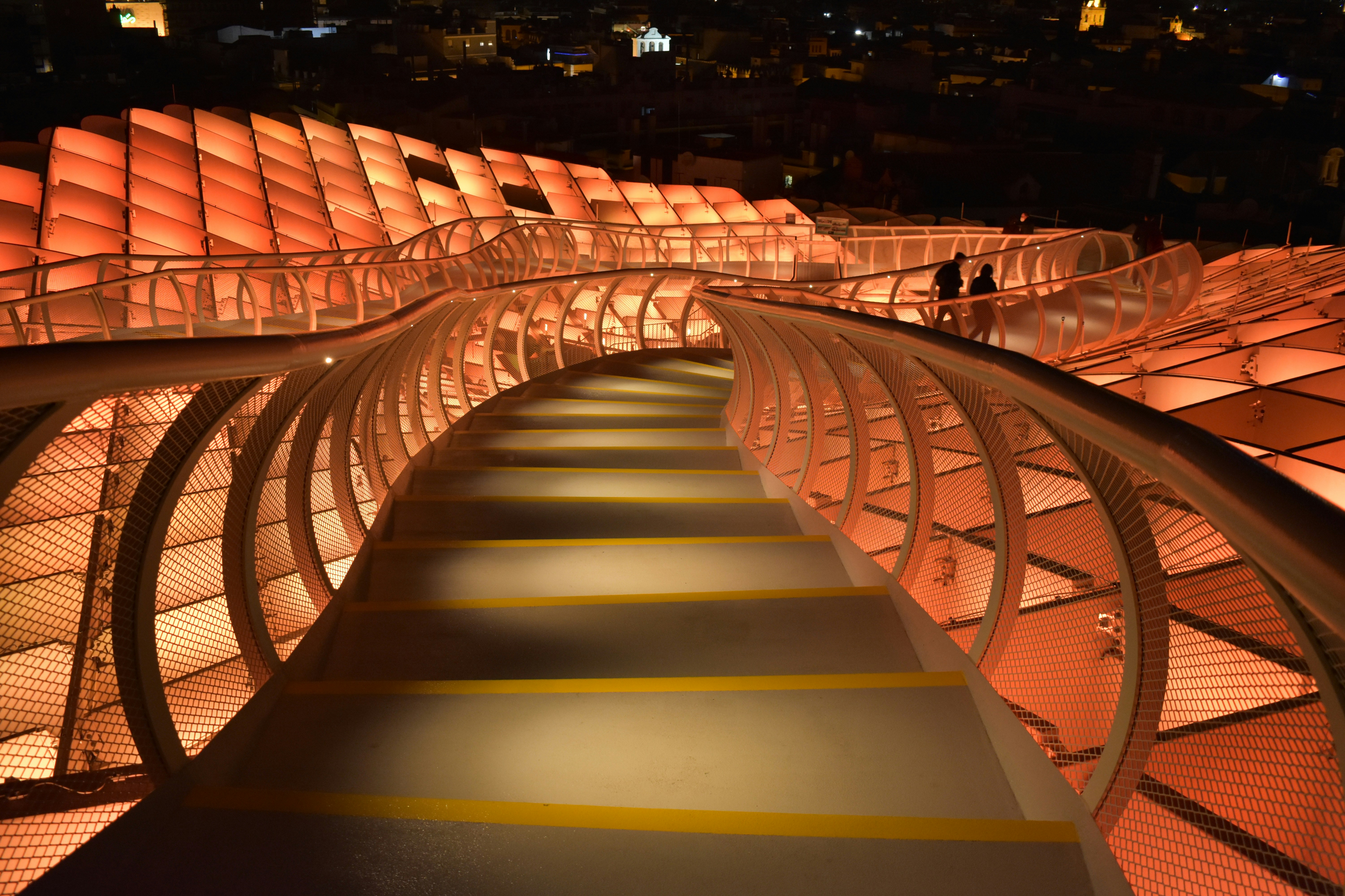 Illuminated Spiral Crossing: A Night Walk on the Sunrise Bridge