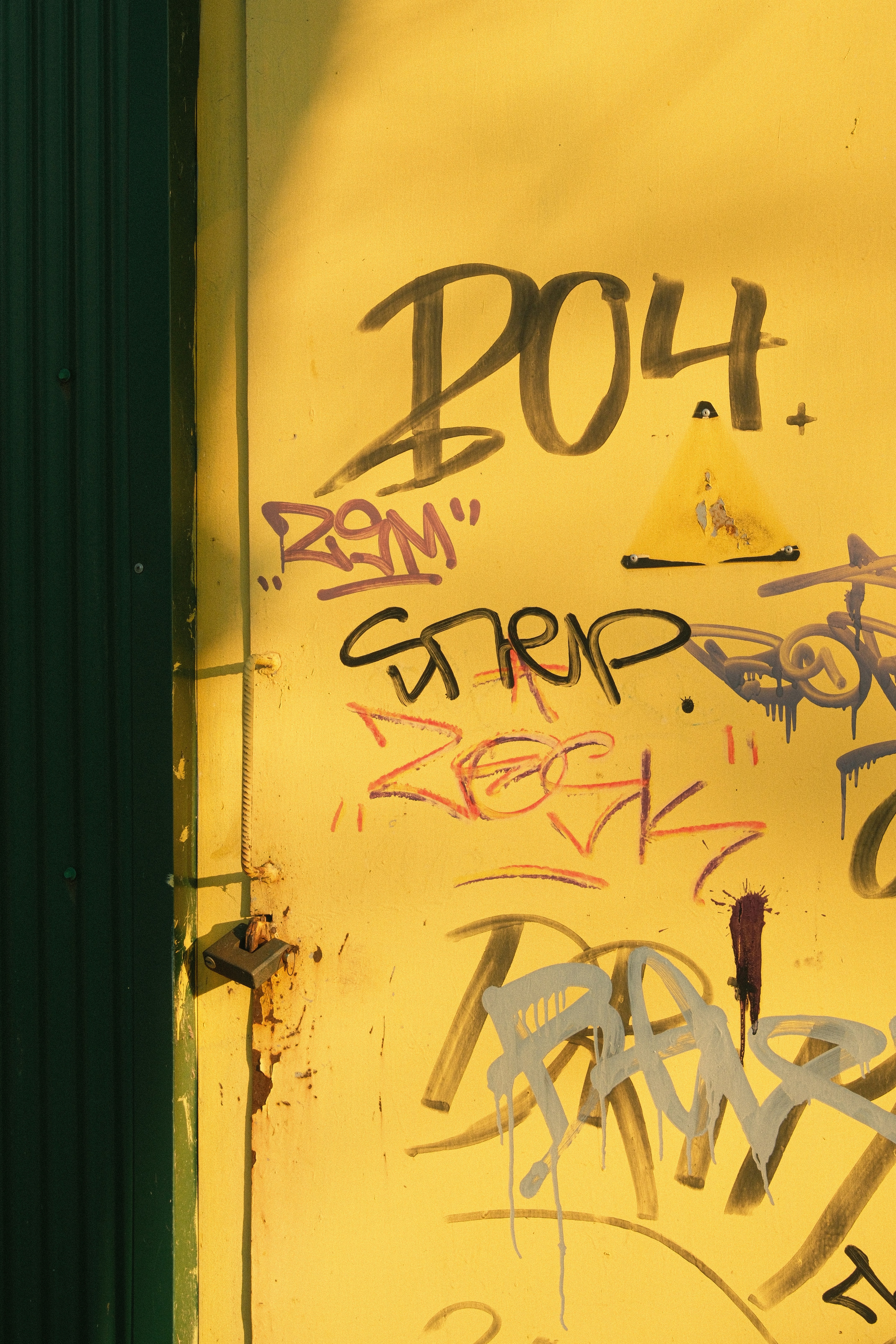 Urban Yellow: Graffiti Wall in Warm Sunset Light