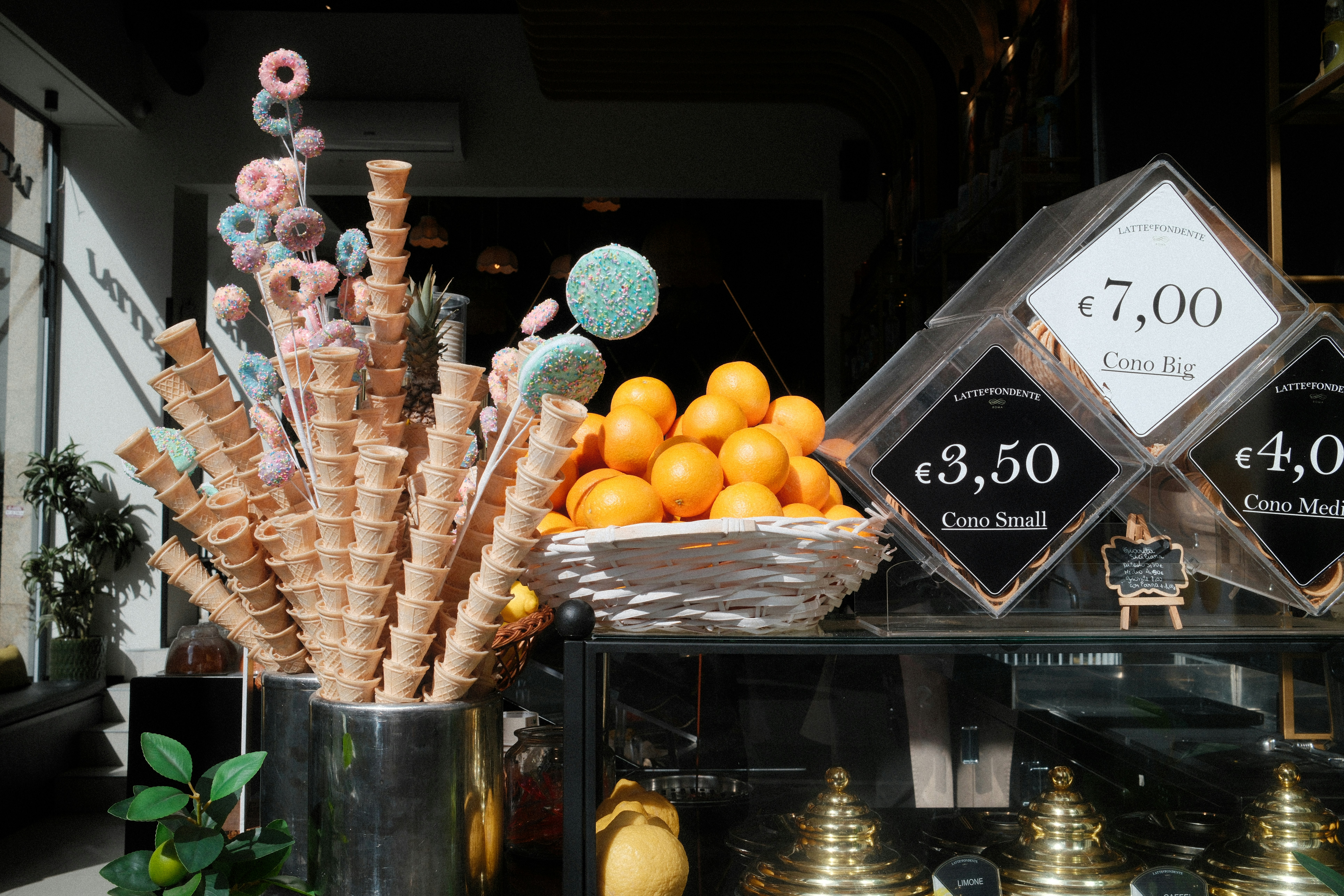 Sugared Towers and Citrus Banner at a European Café Counter