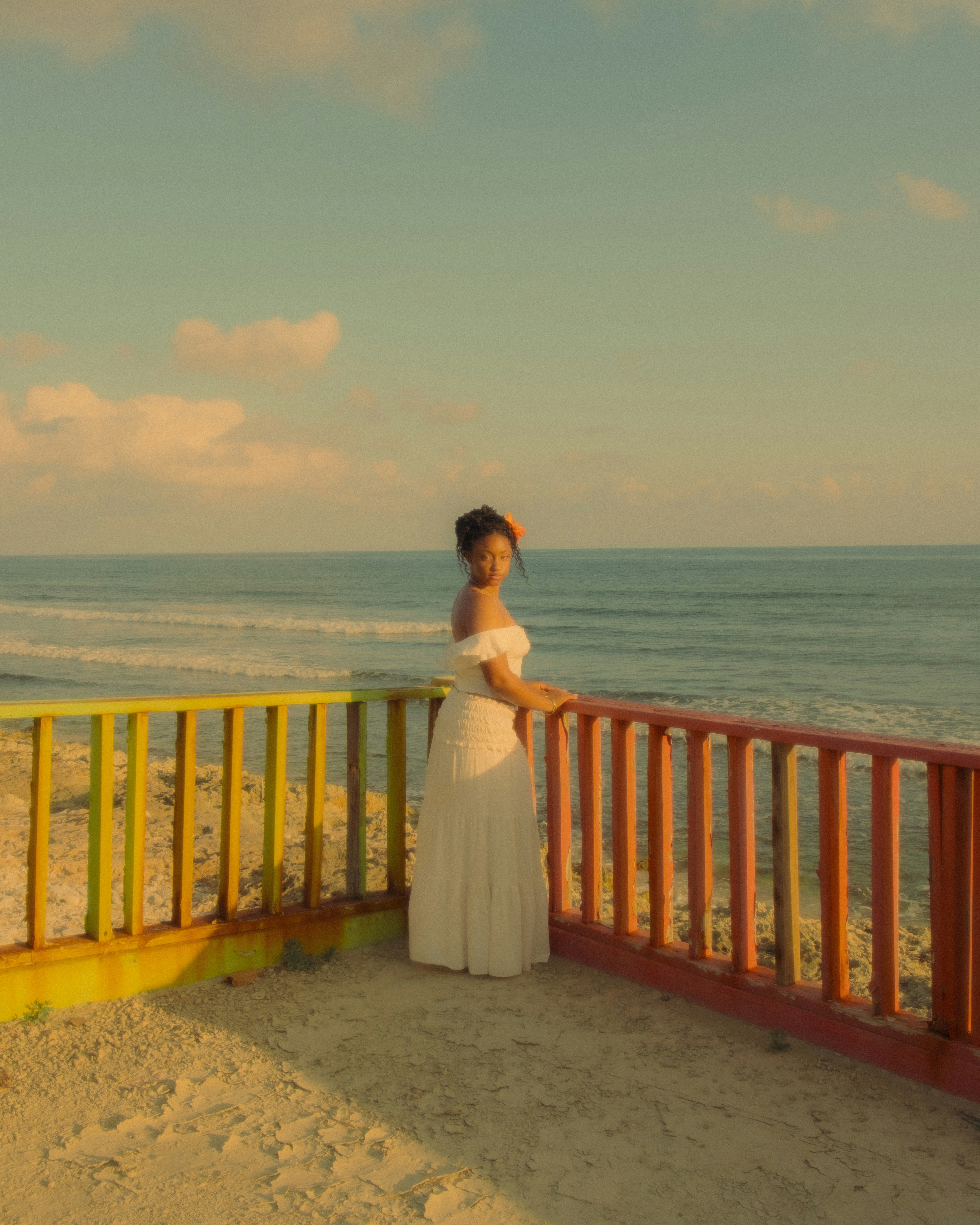 Sunlit Coastal Portrait in a Hued Sunset