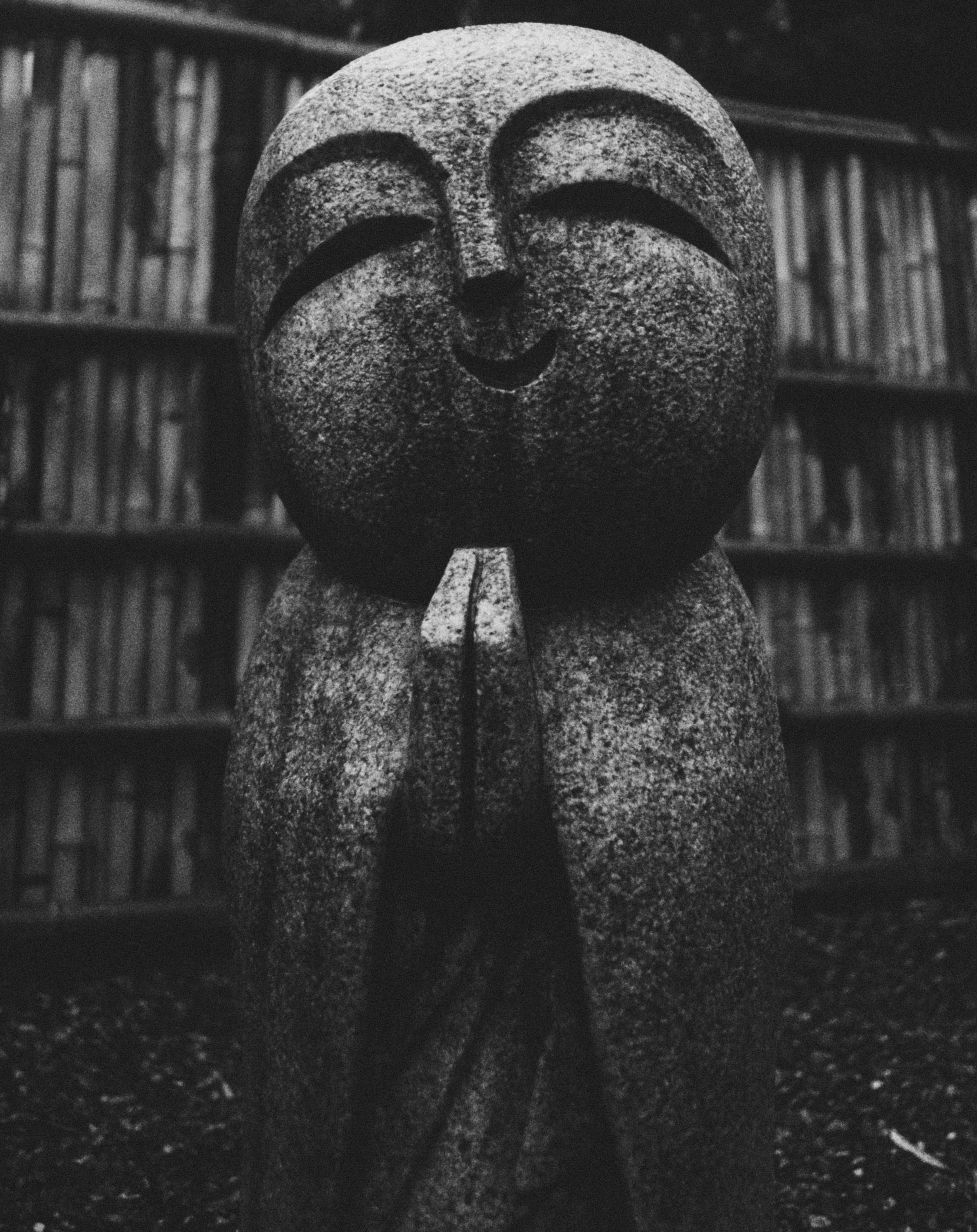 Quiet Gratitude: A Stone Statue with Hidden Smiles