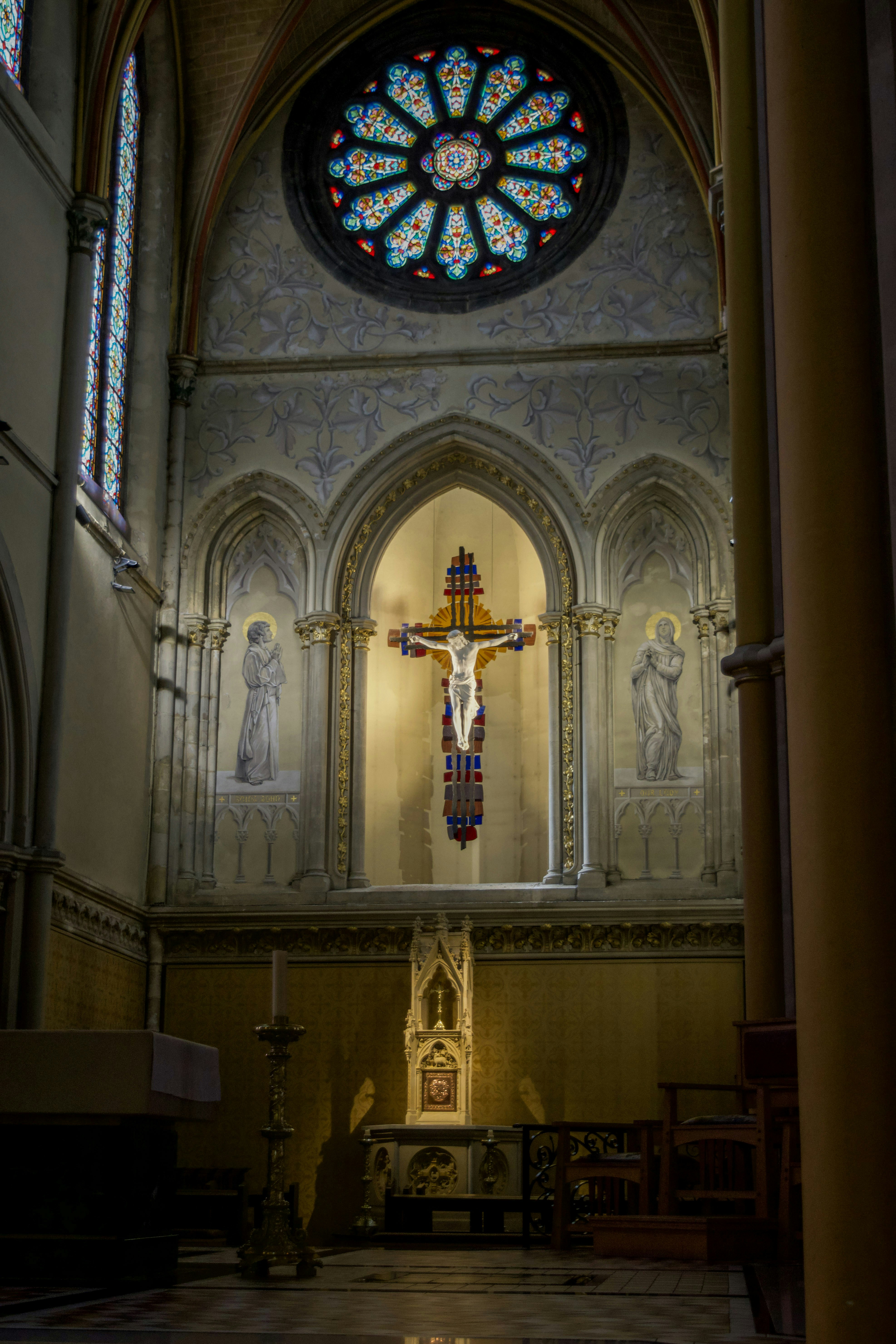 Cruciform Cathedral Light: Stained Glass and Sacred Silhouettes