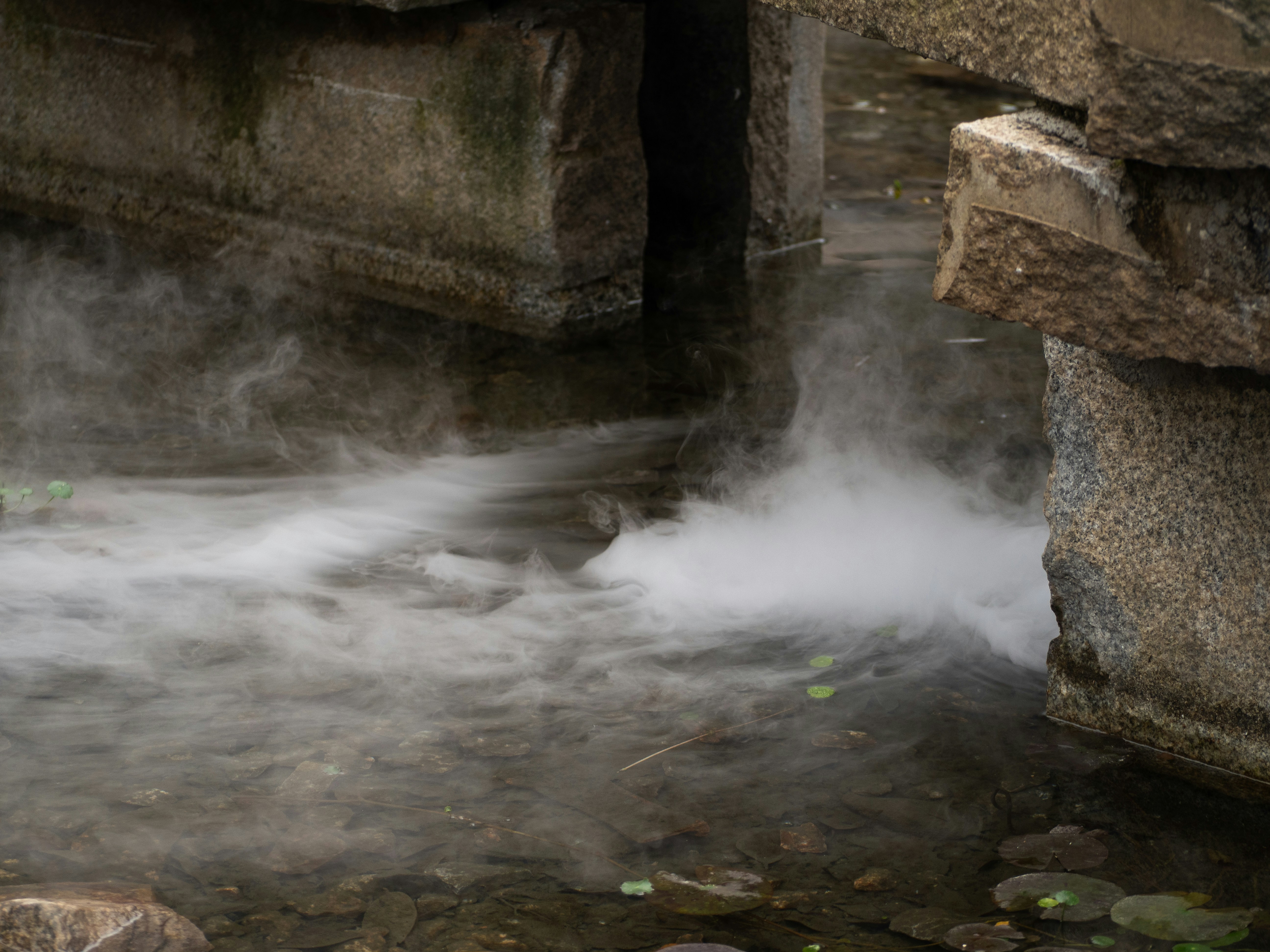 Misty Water Under Stone Arches
