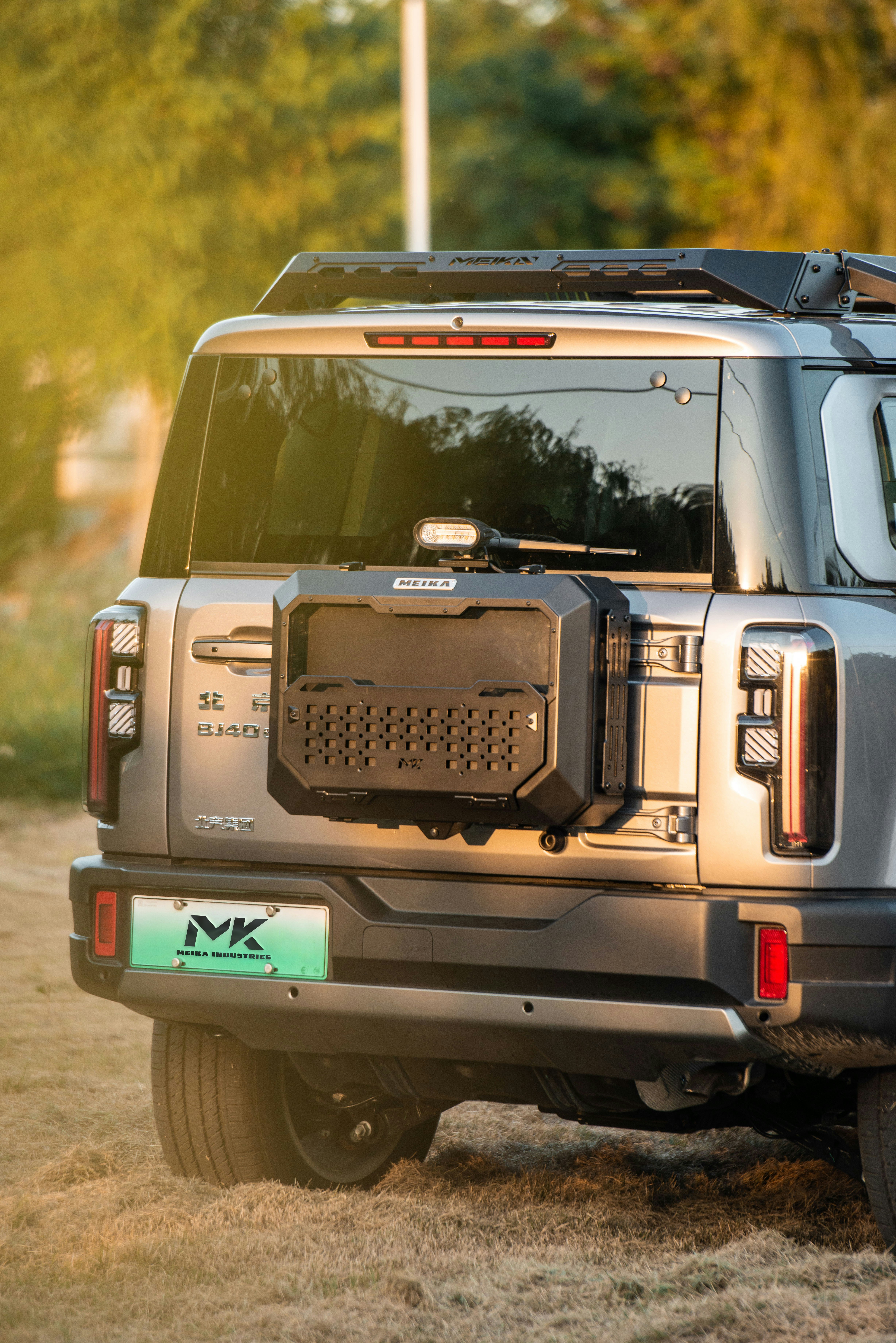 Rear-View Resilience: A rugged off-road silhouette under late-afternoon light