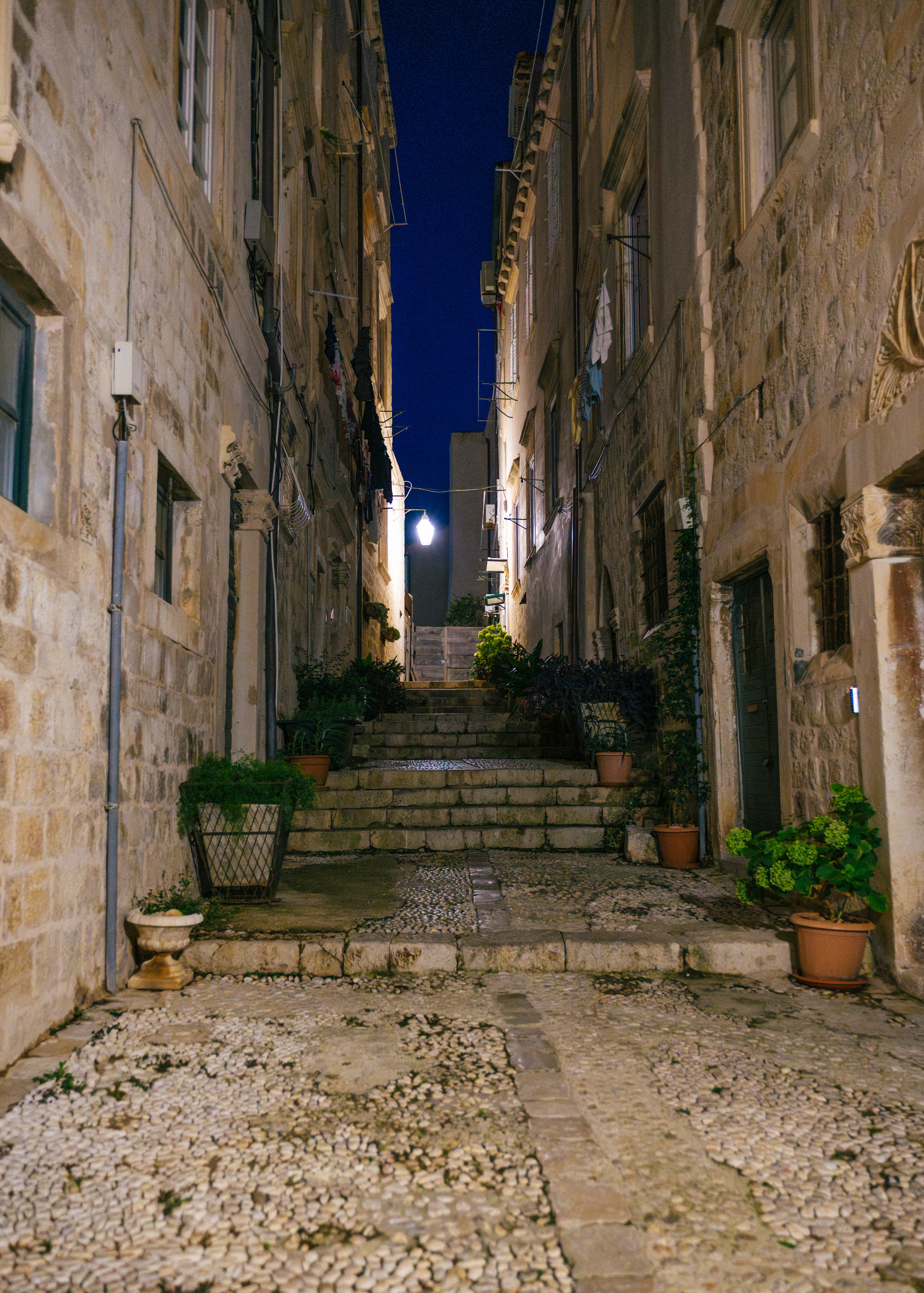 Lantern-lit Alleyway: Stone Steps to the Quiet Night