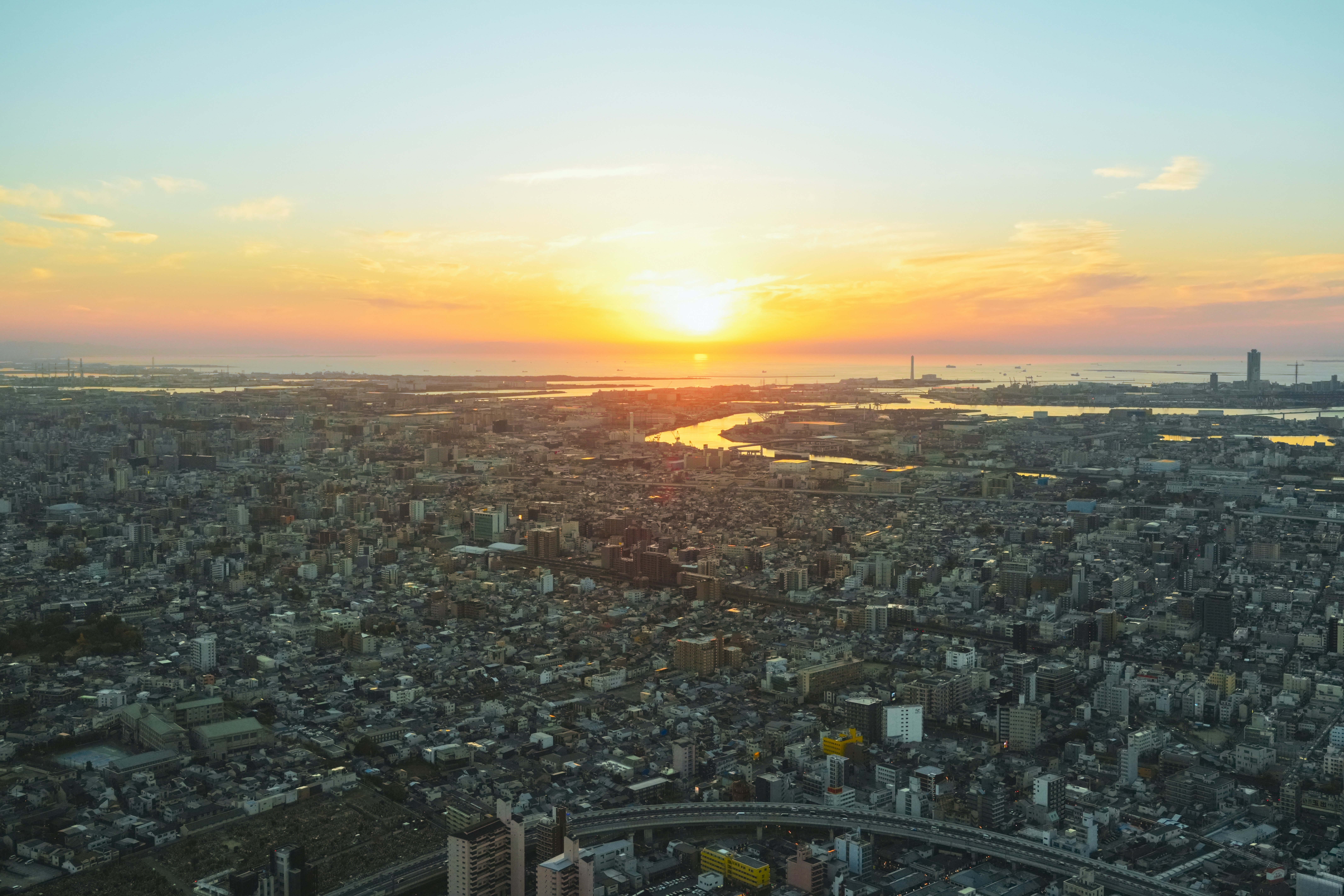 Dawn Over the Grid: City Awakening to the River Light