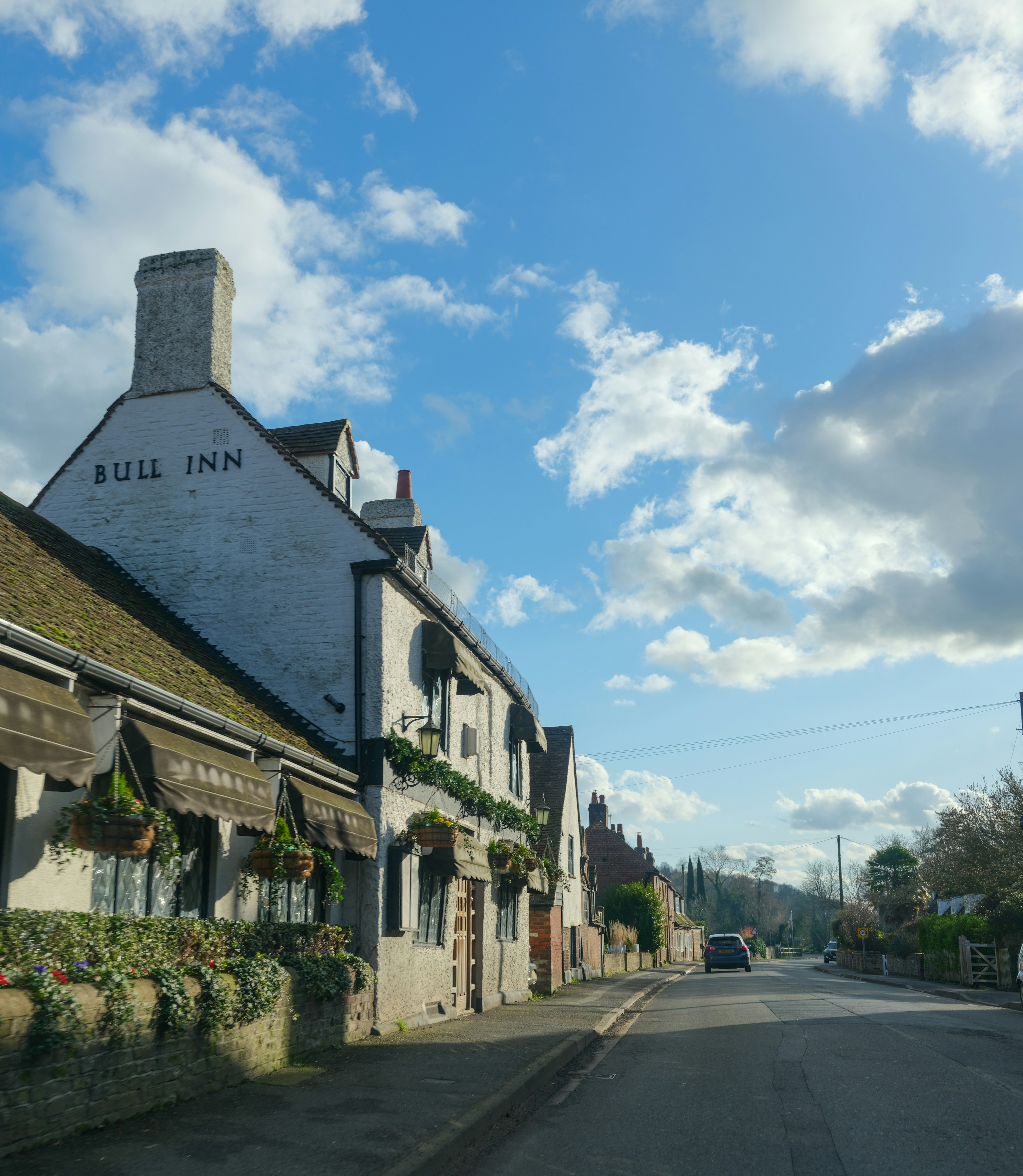 Distant Car on a Quiet English High Street
