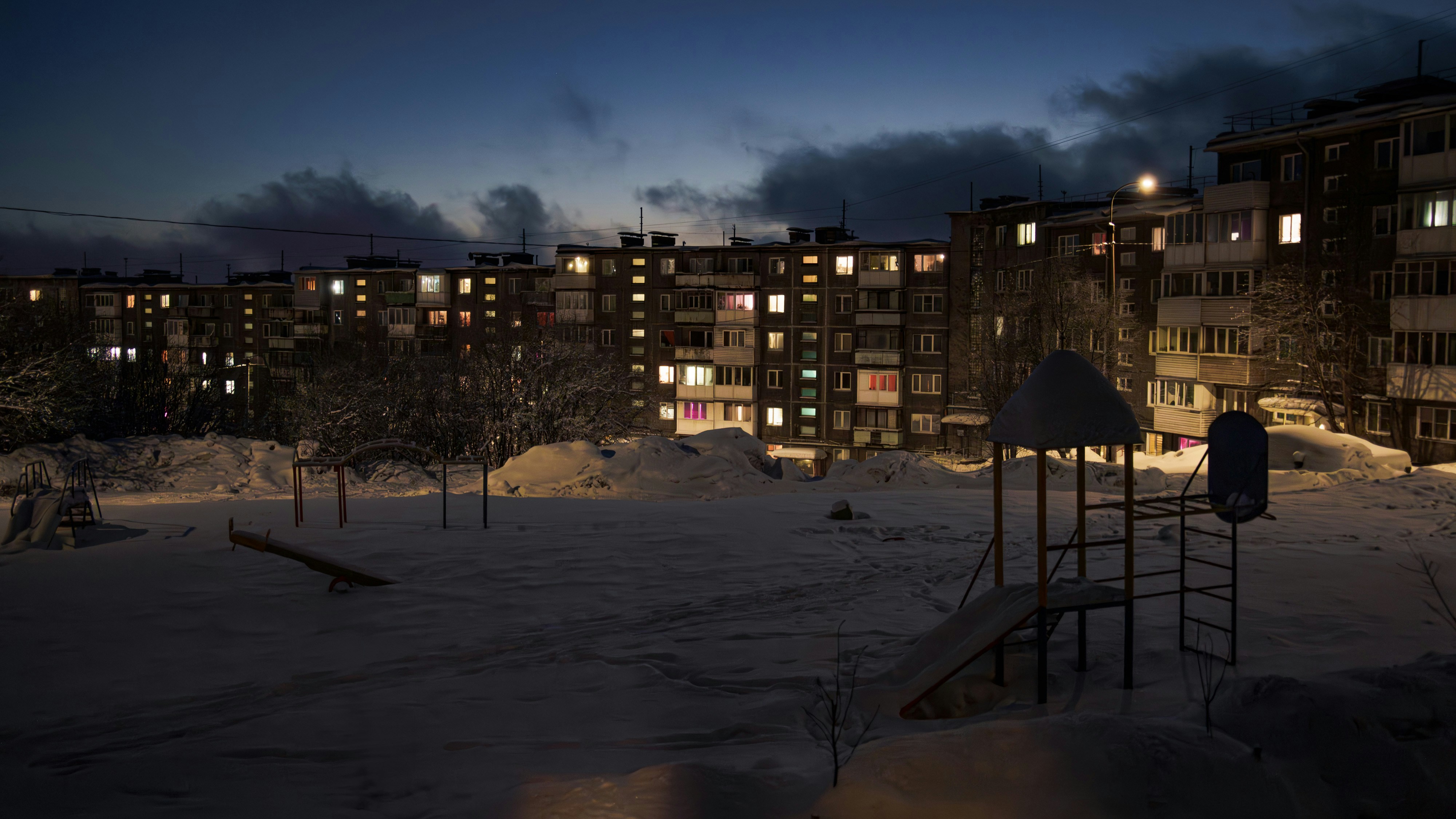 Winter Lights Over a Quiet Apartment Block