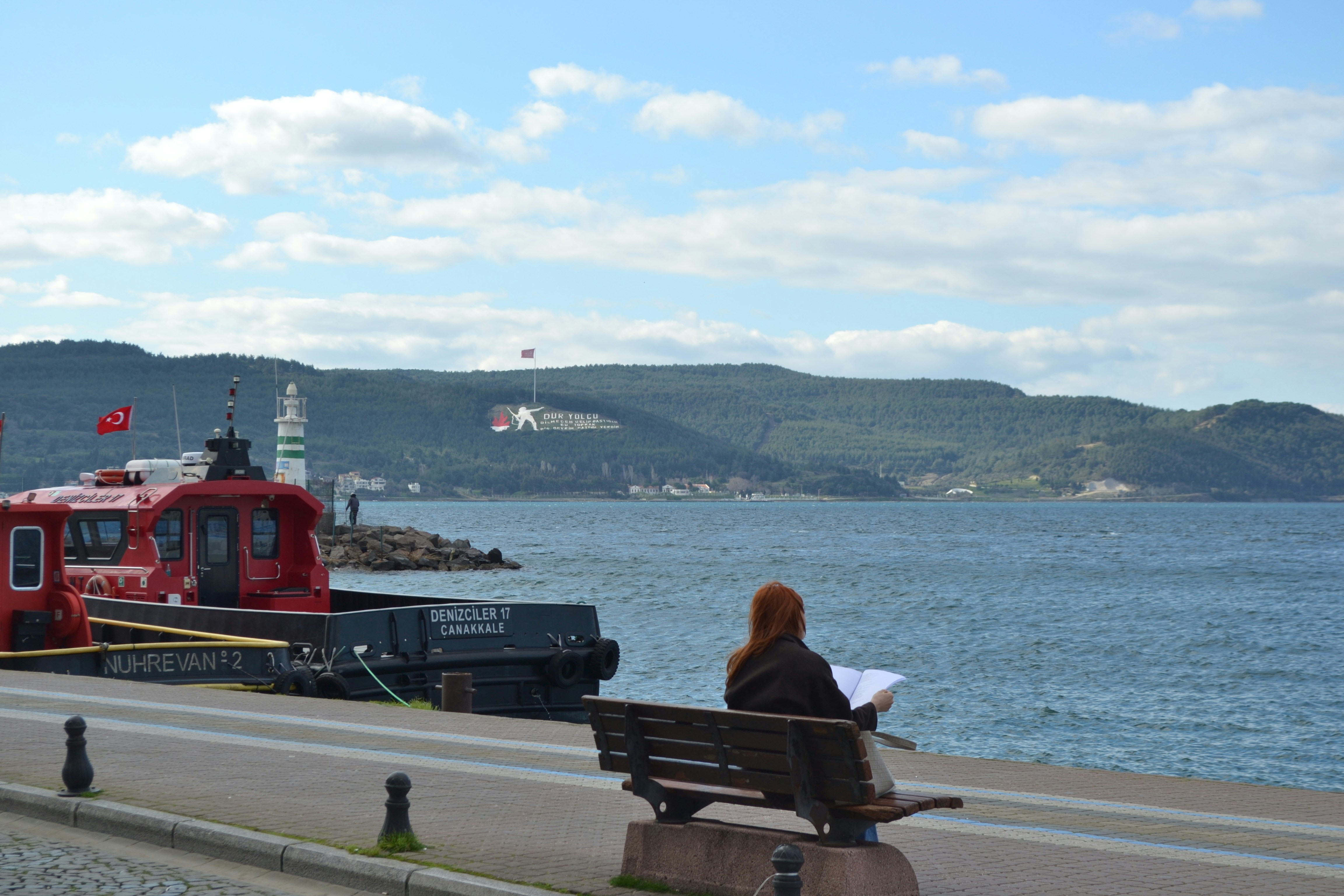 Red Boat at the Quay: A Quiet Moment by the Sea