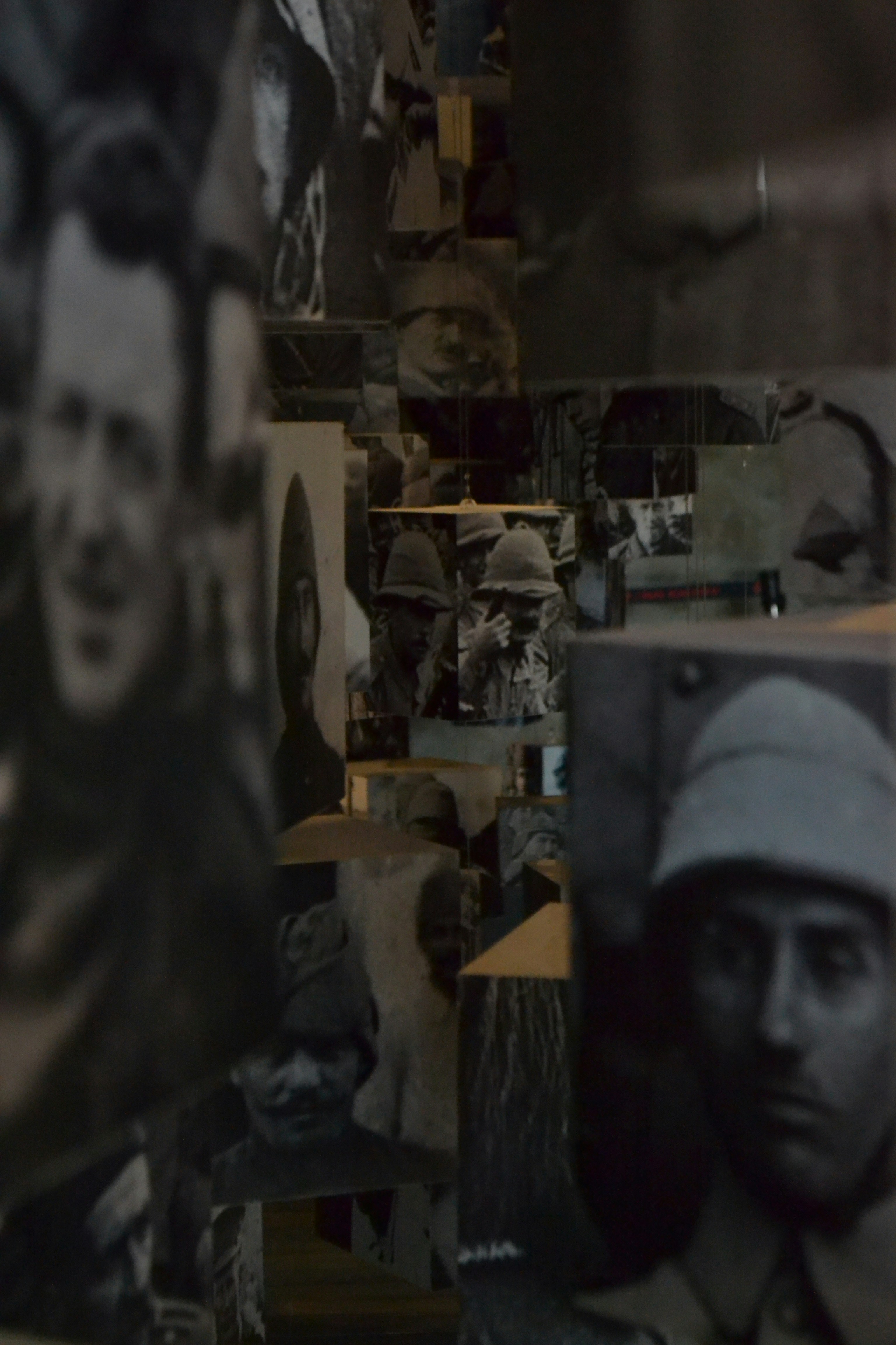 Echoes of Faces: A Wall of Photographic Fragments