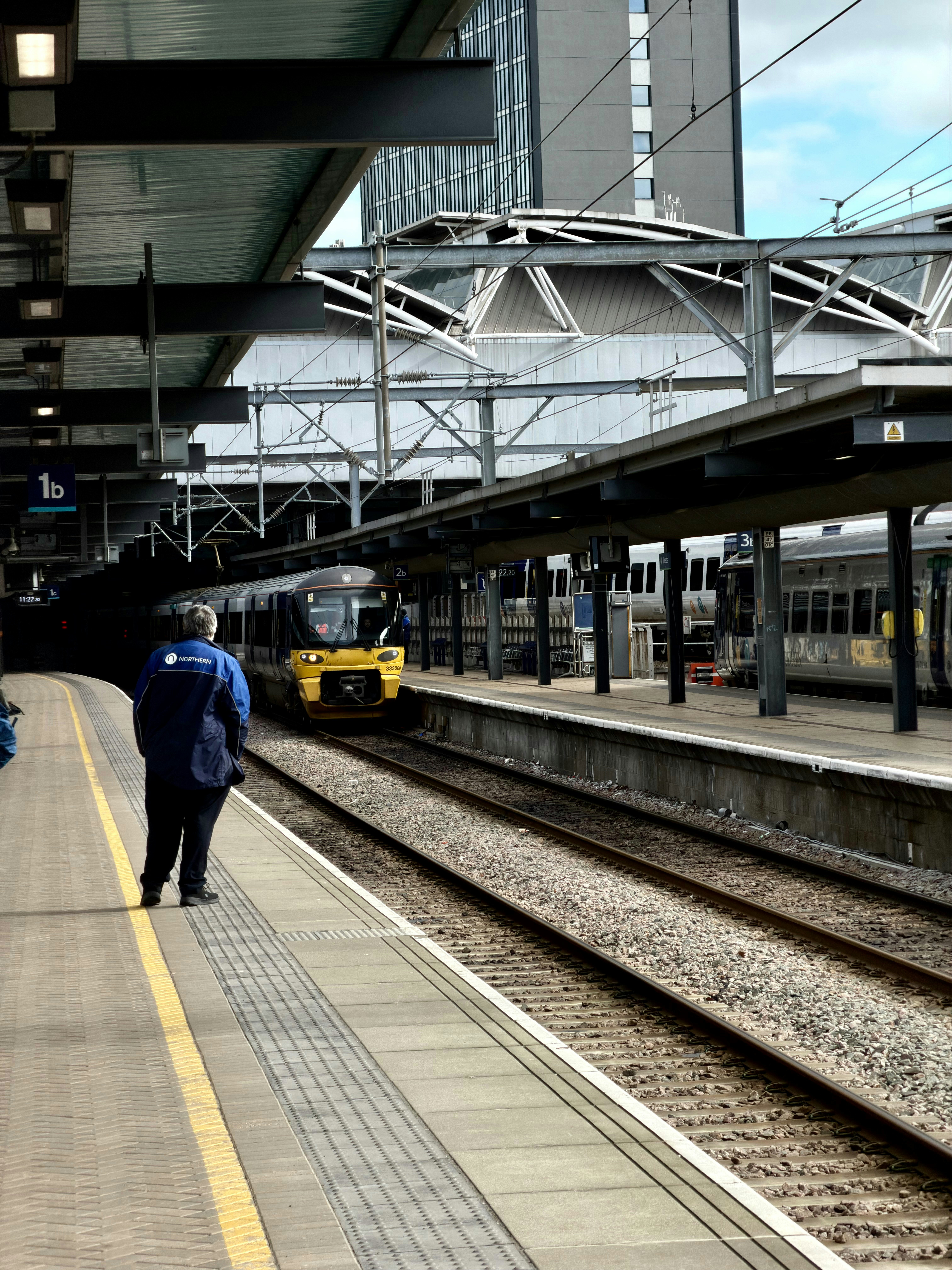 Platform Portrait: A Sleeper in Neon and Steel