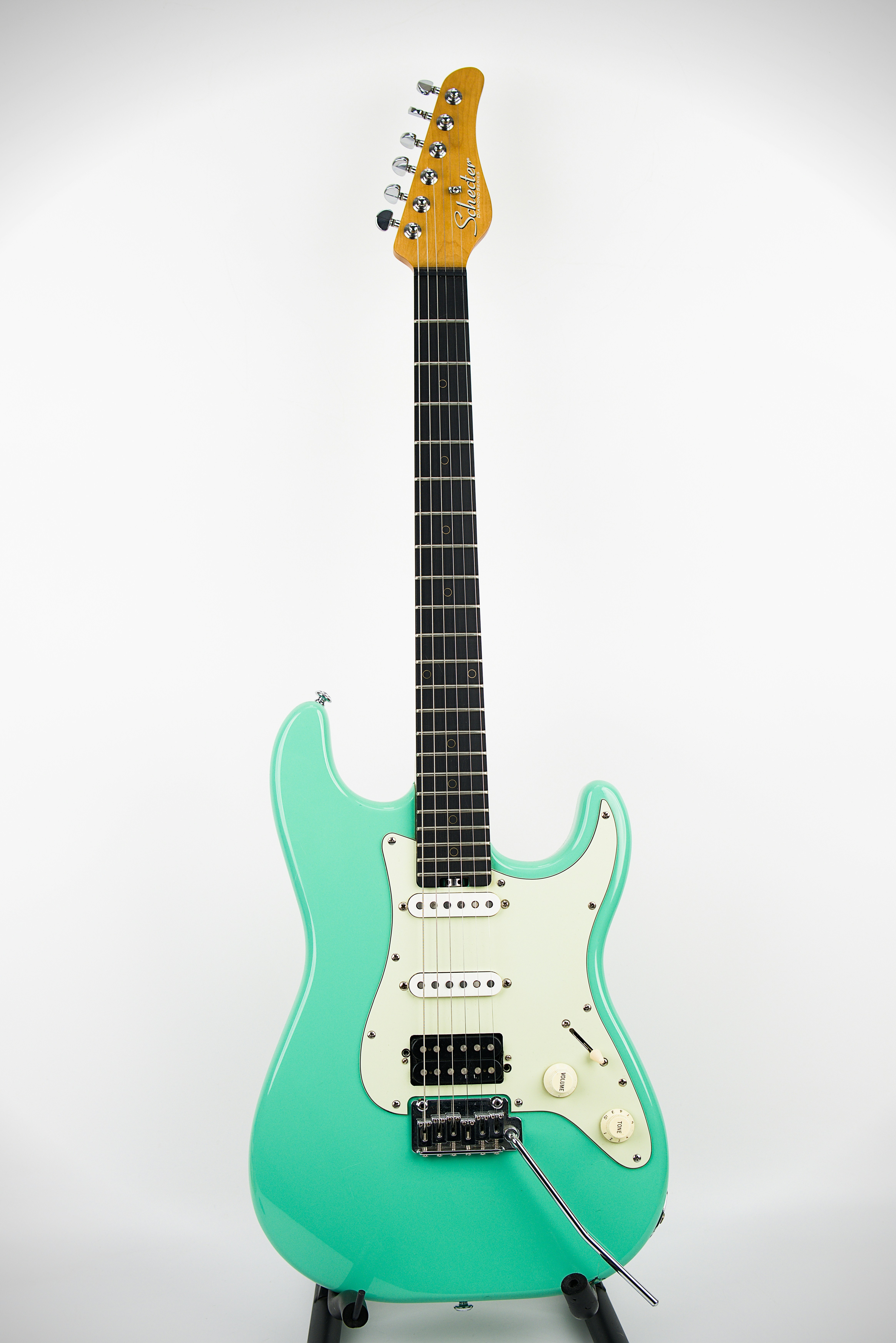 Minty Neon: A Mint-Glass Tele-Style Guitar Standing Tall