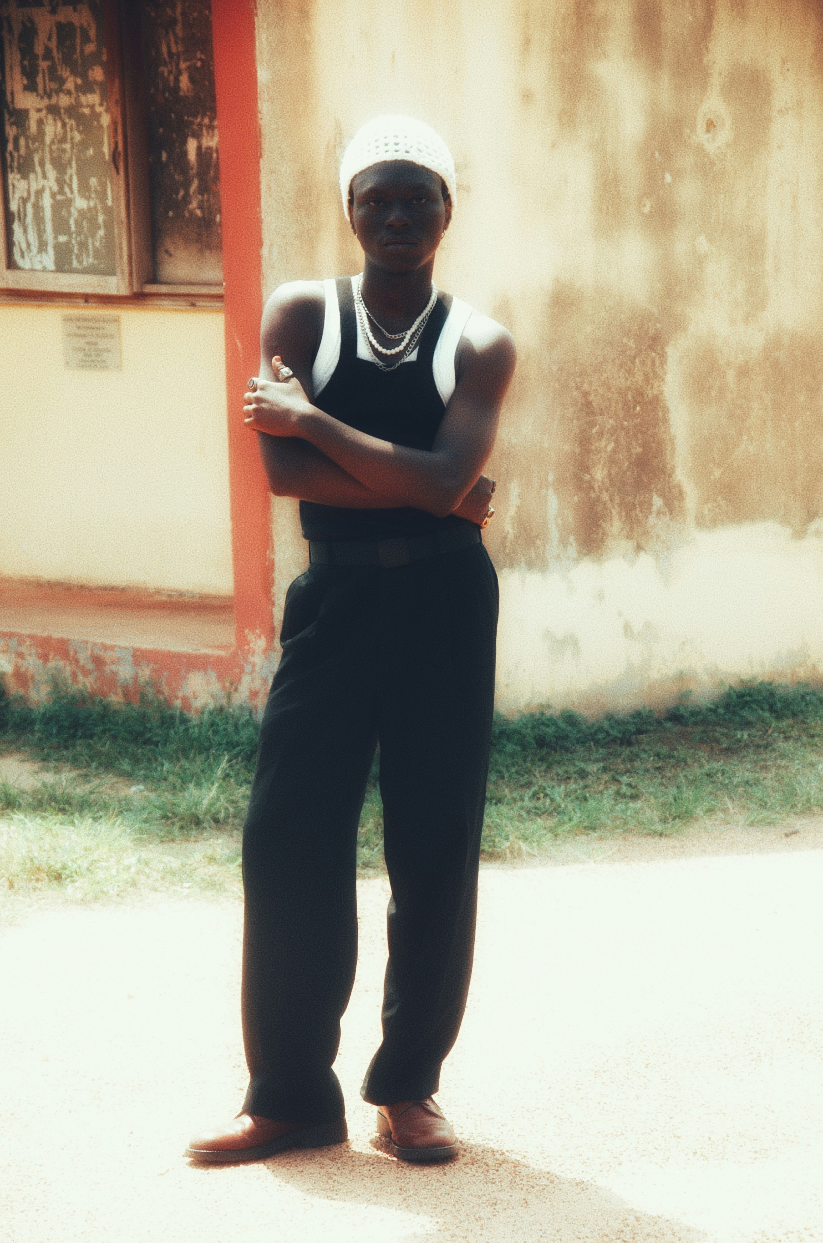 Armored Poise: A Portrait in Warm Streetlight