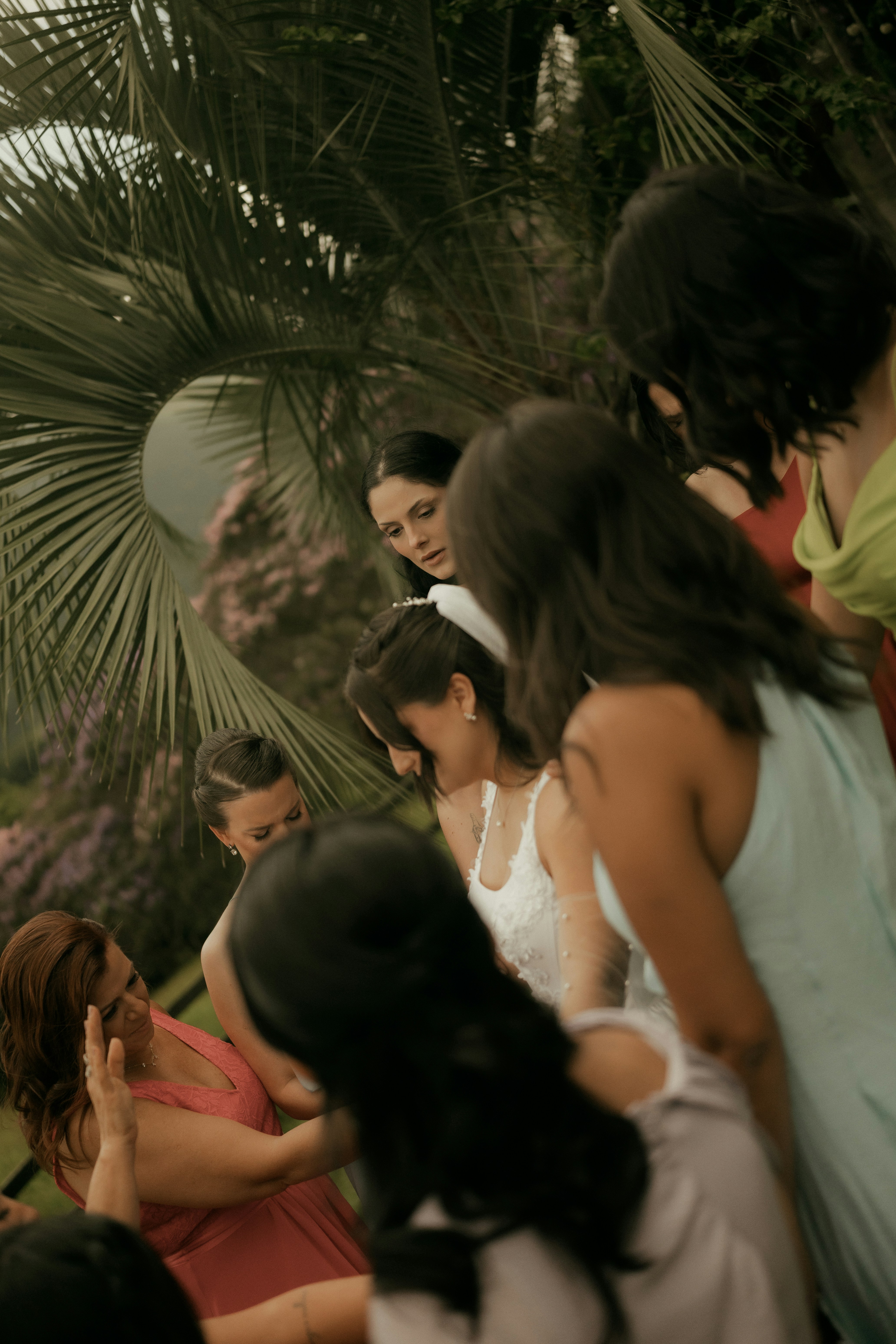 Gathered Bridesmaids Lean into a Quiet Moment