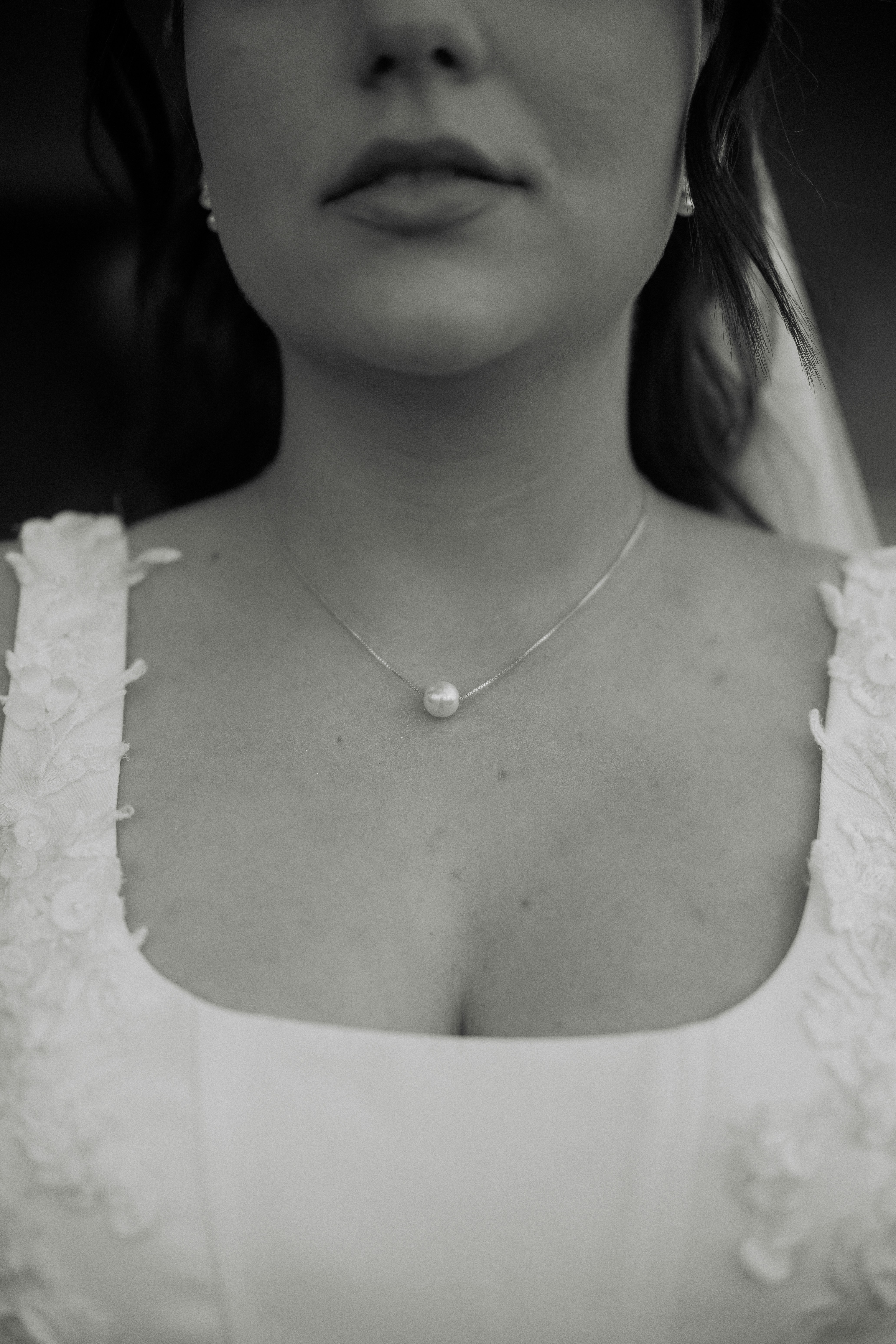 Pearl Necklace, Quiet Glow: A Bride’s Neckline in Soft Focus