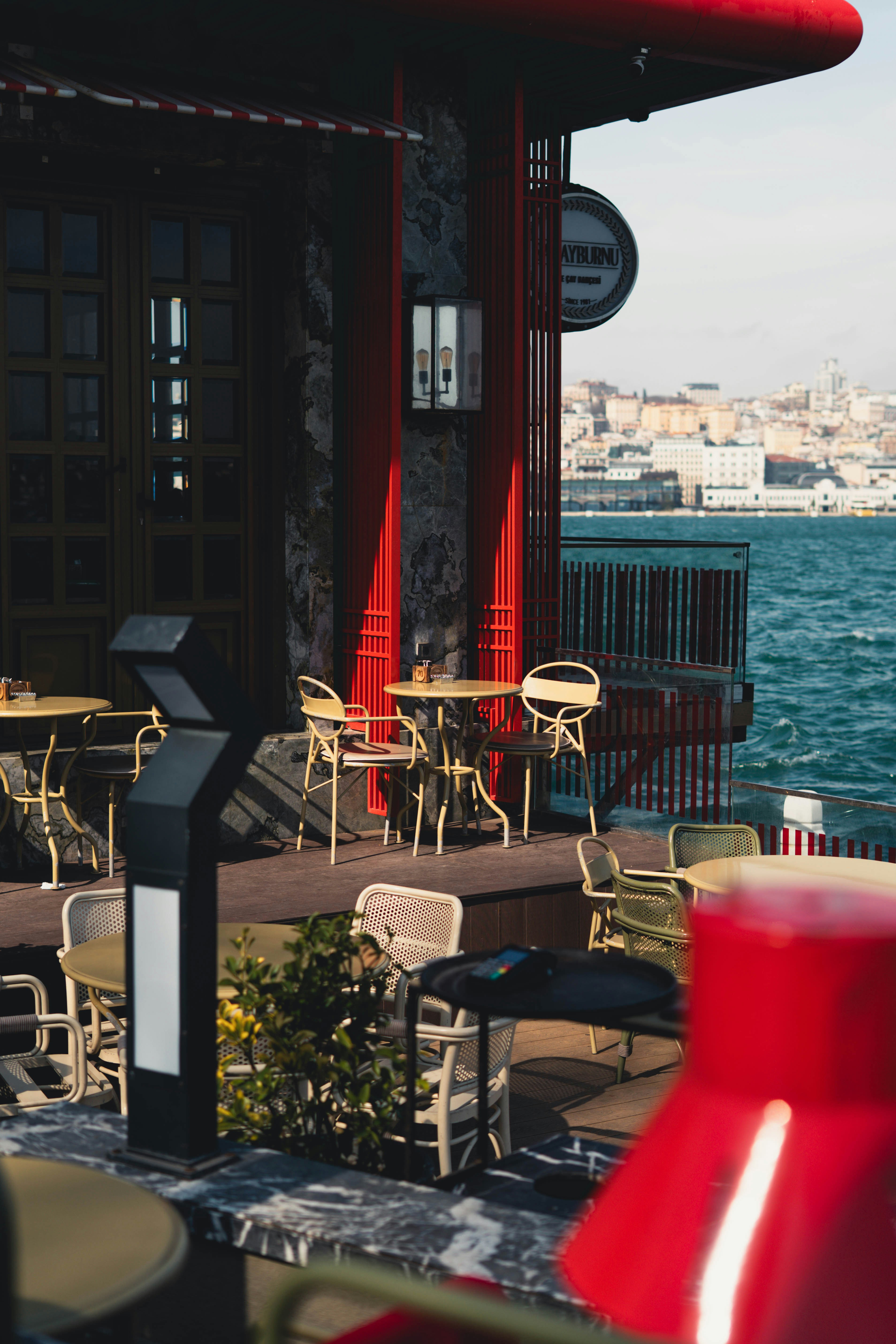 Red Café by the Sea: Coastal Terrace with Sea View