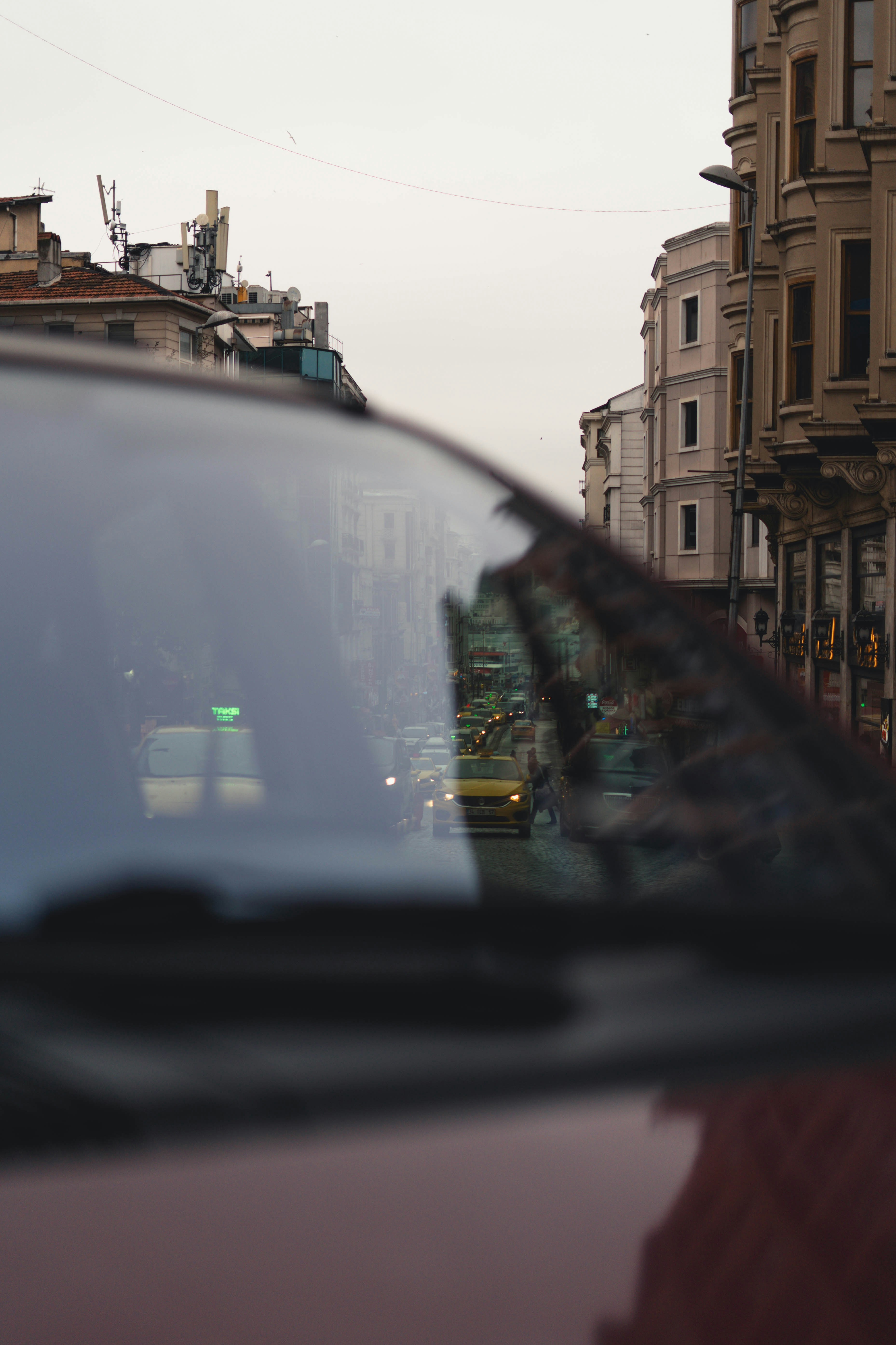 Through the Car Windshield: City Streets and Reflections