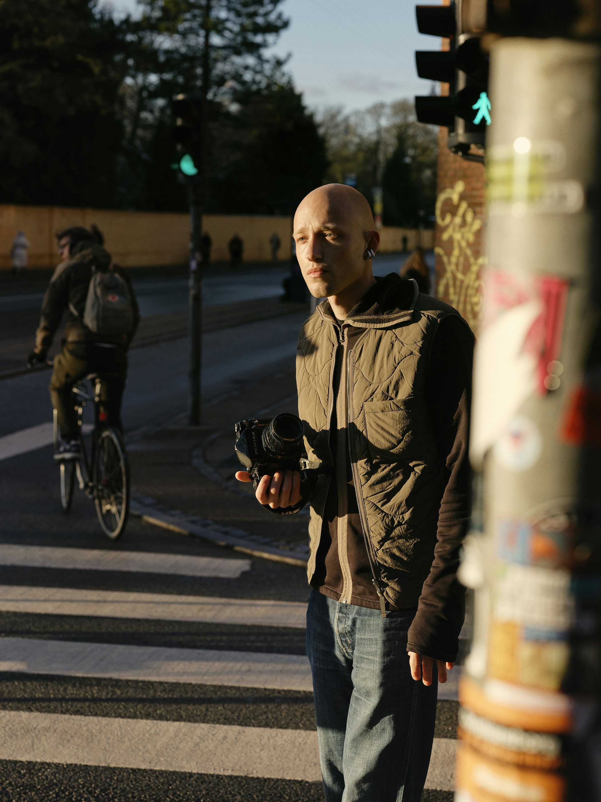 Portrait at a Street Crossing: The Photographer in Focus