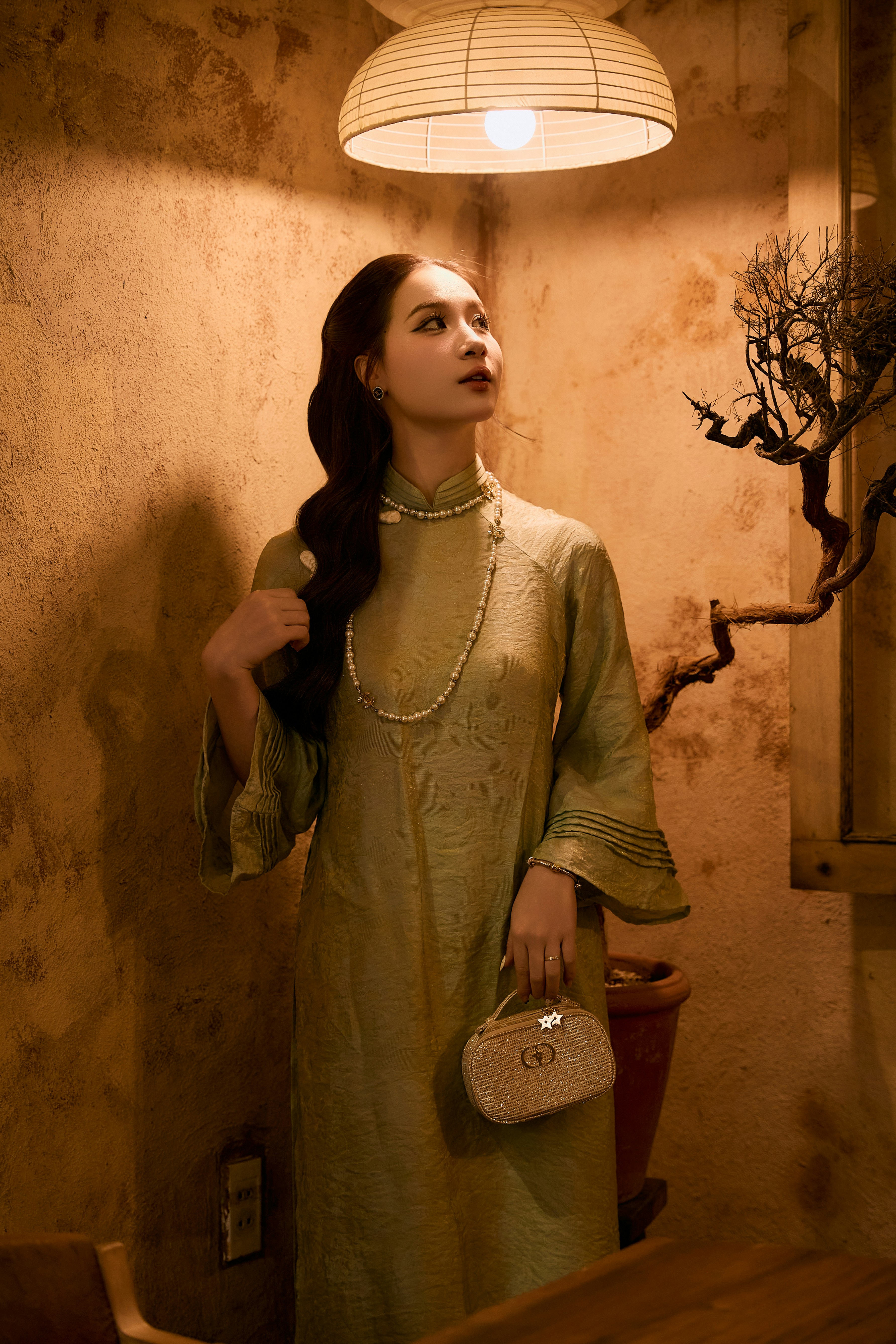 Pearl on Velvet: A Quiet Portrait Under Warm Light