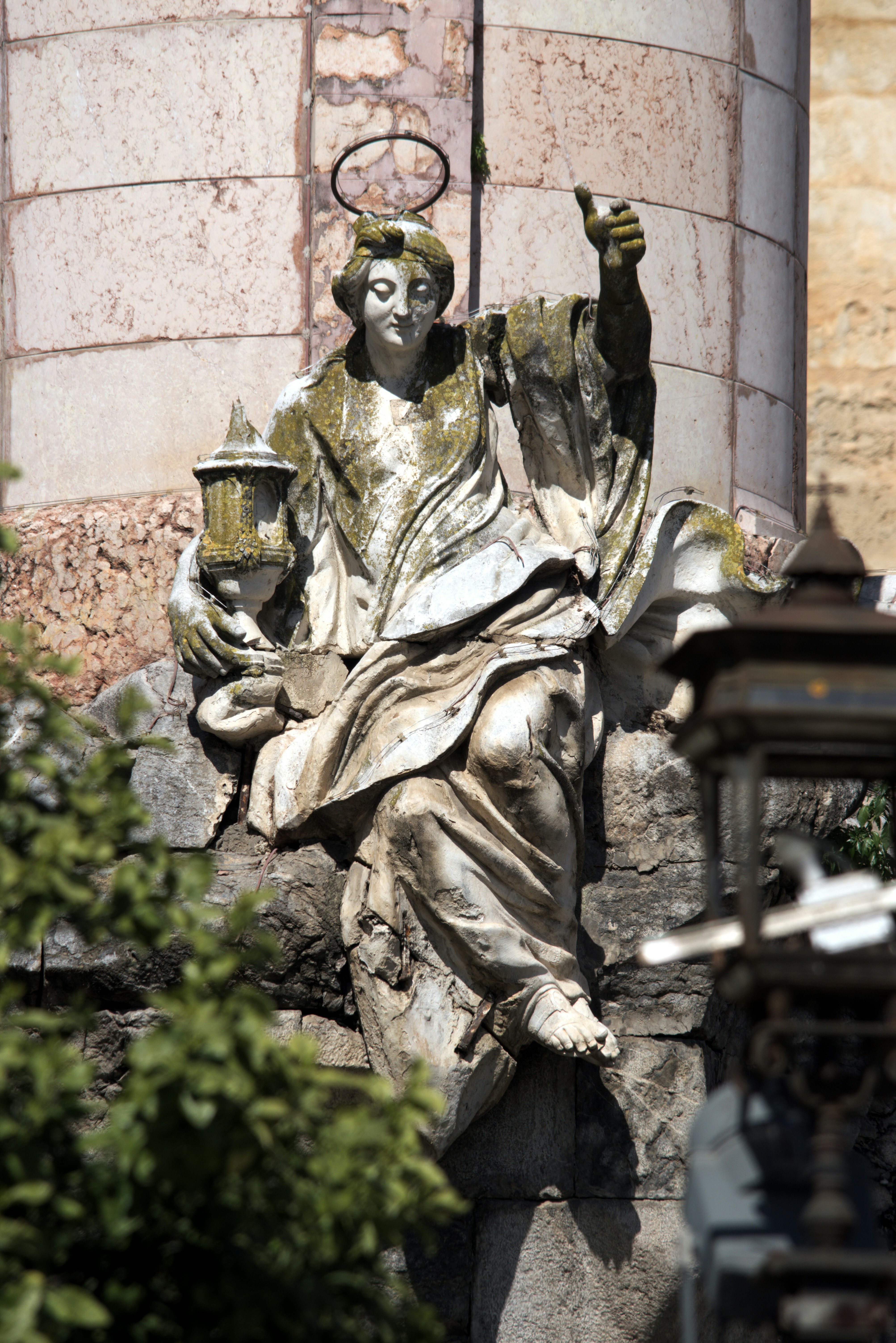 Stone Angel Under Arching Halo: A Quiet Moment by the Monument