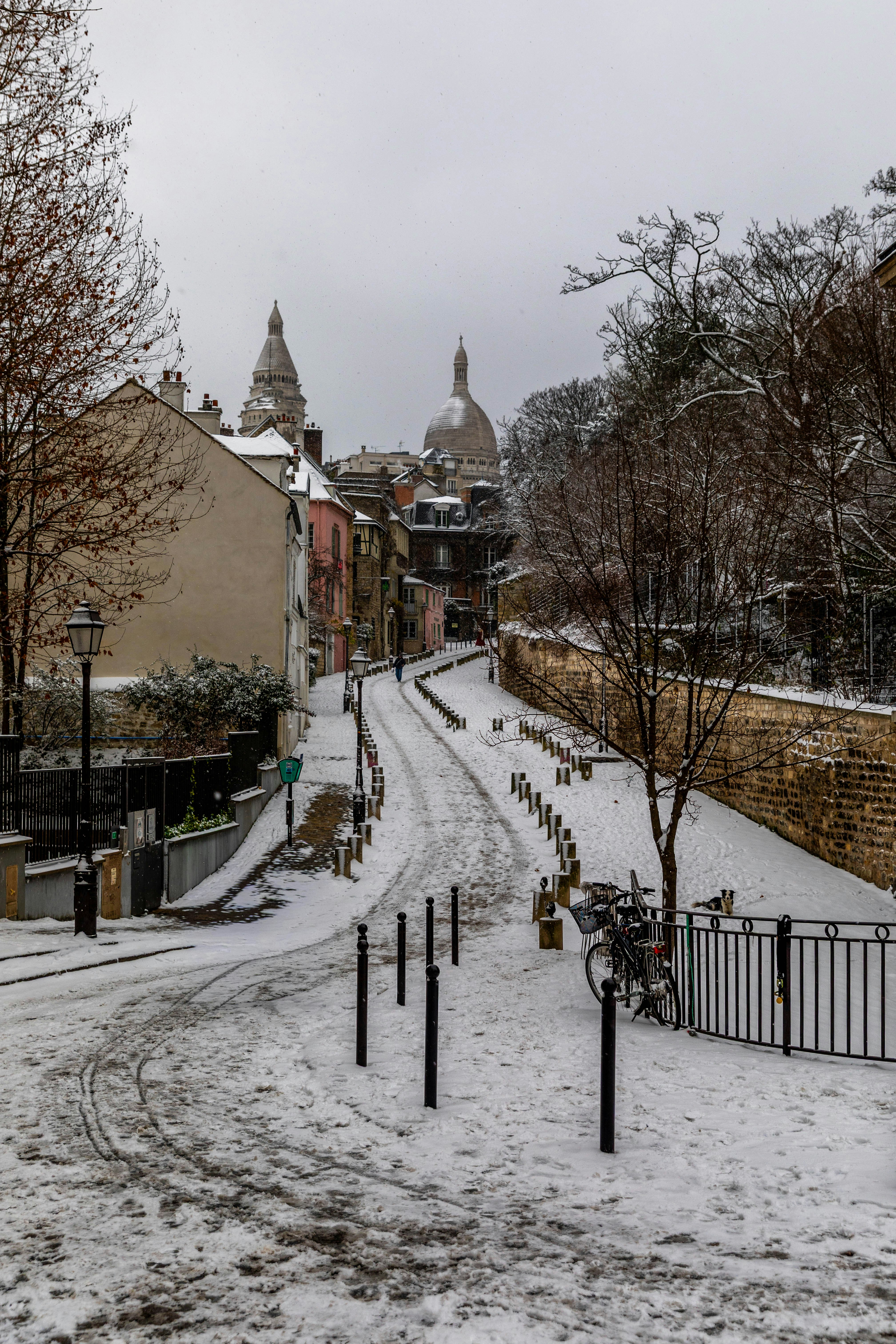Snow-laden Rue Toward Sacré-Cœur: A Quiet Parisian Winter Walk