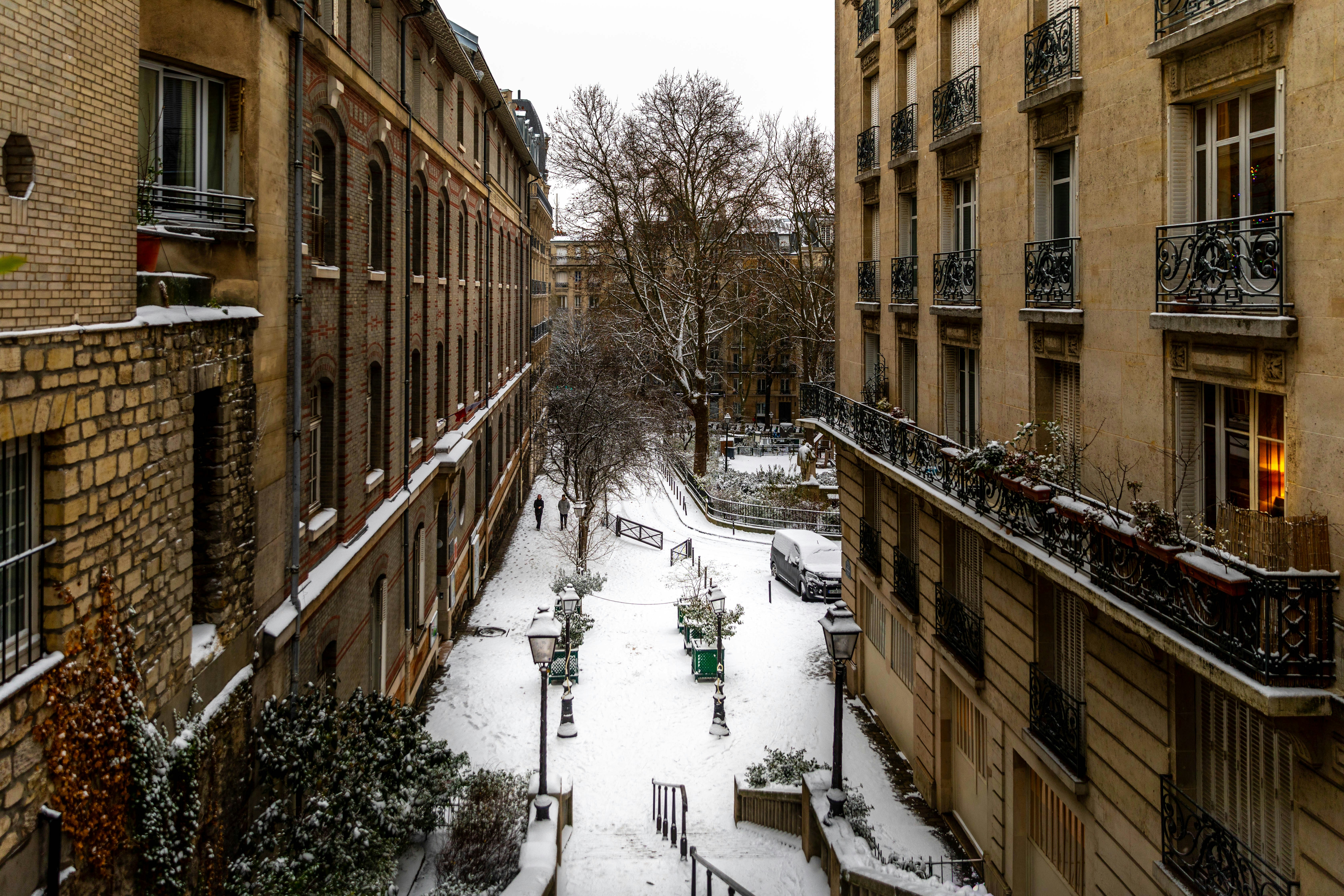 Snow-dusted Parisian Courtyard Roadway
