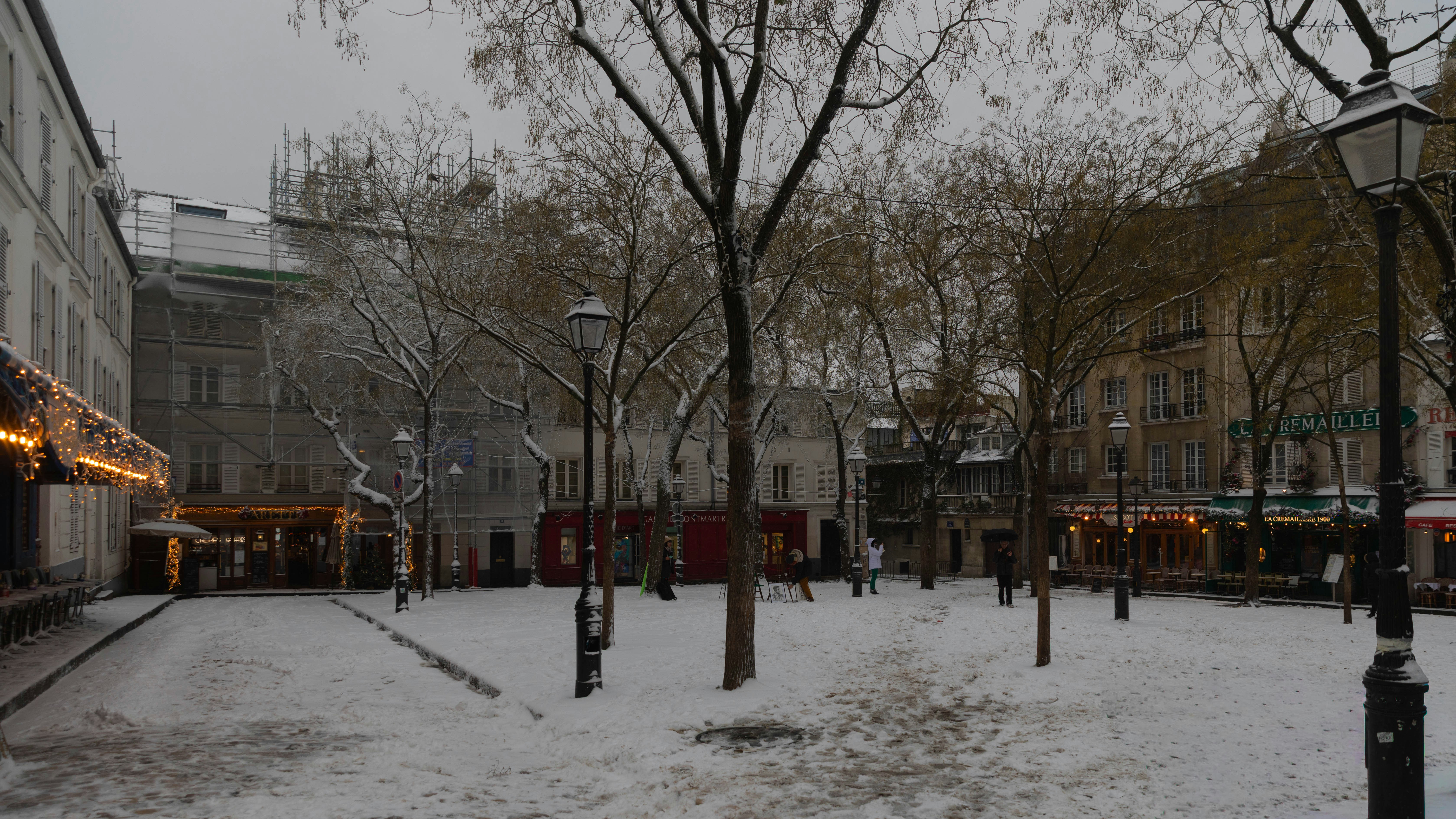 Snowlit Square: Calm Winter Gables and Lanterns