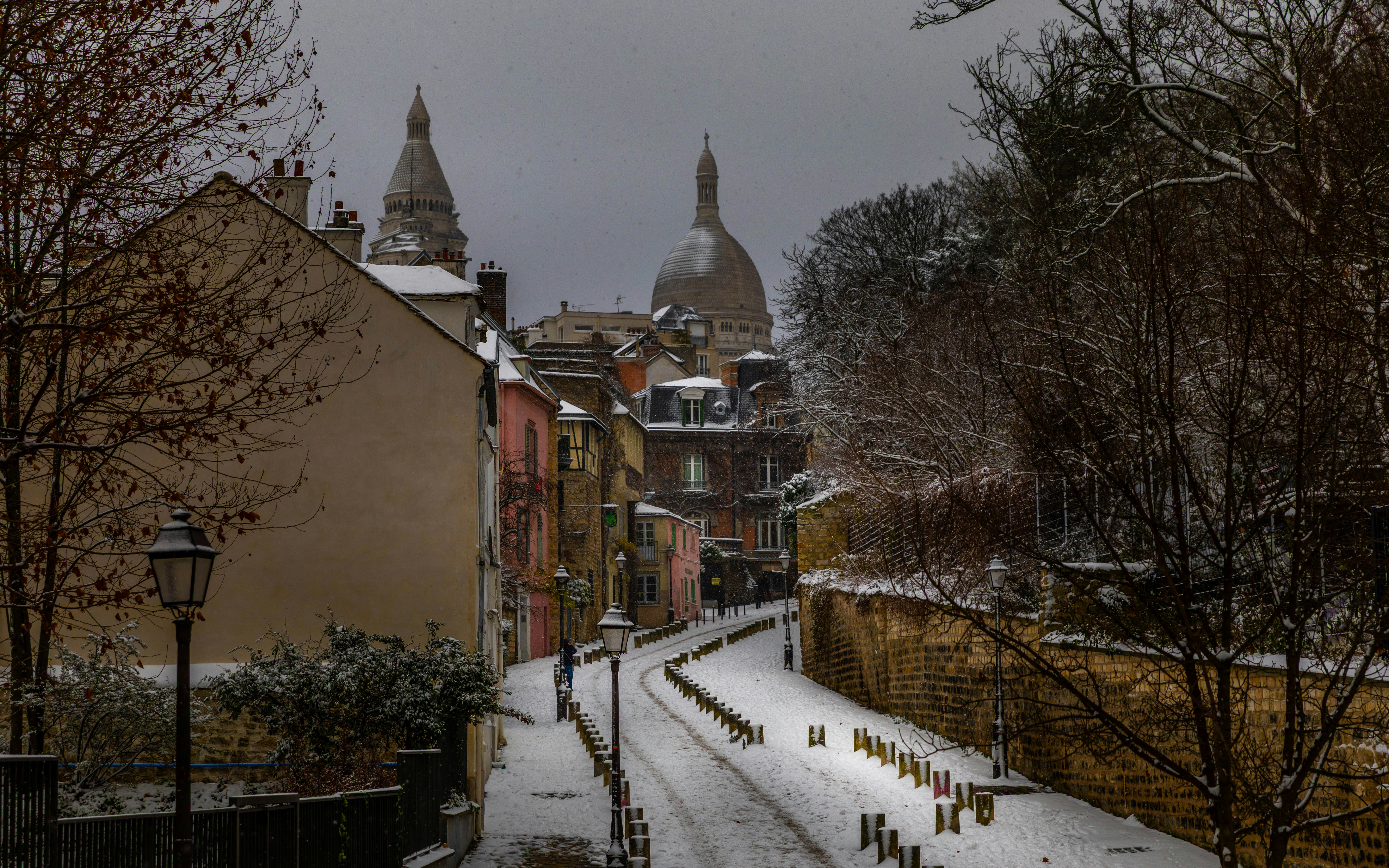 Snow-lined Alley to Distant Domes