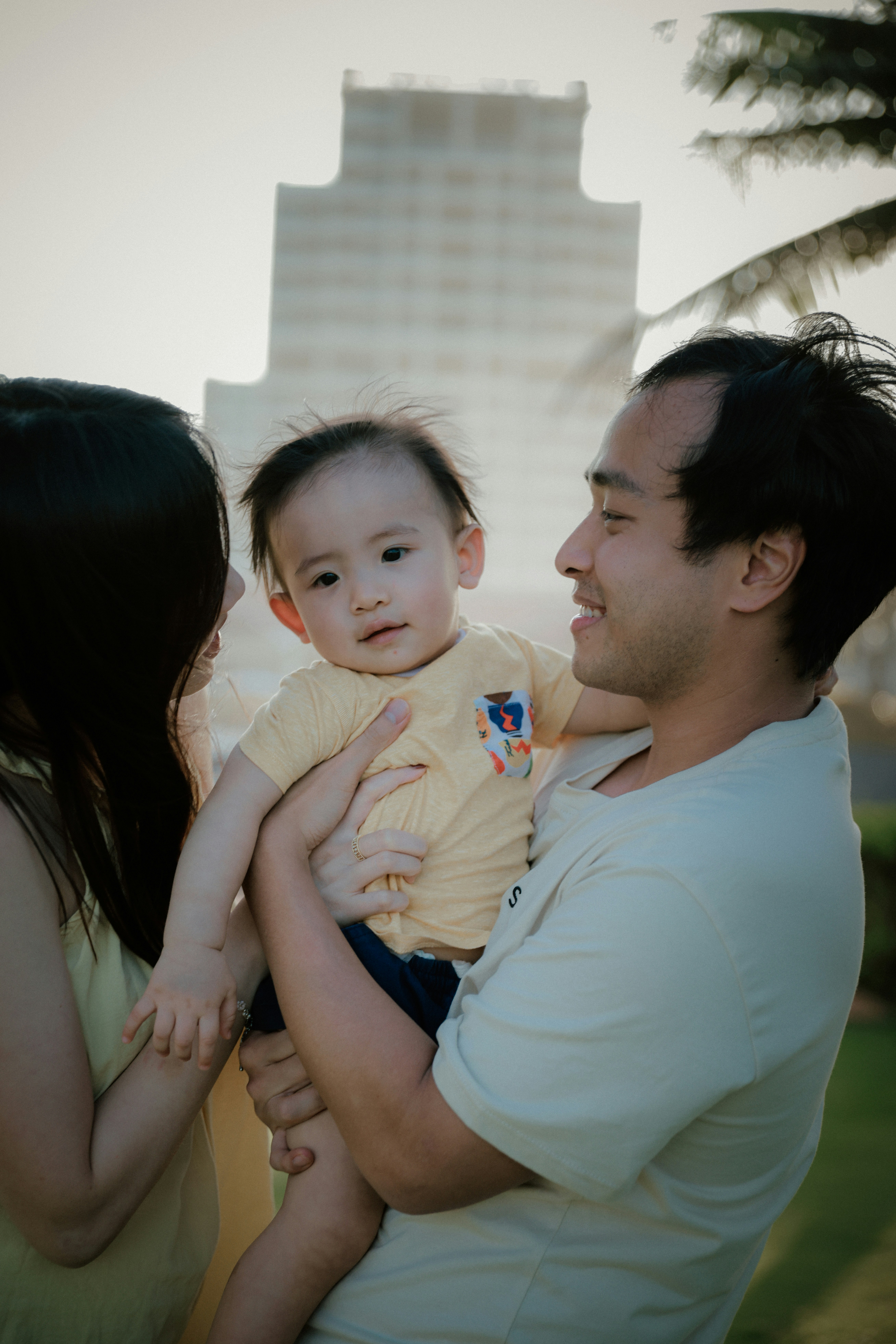 Family Portrait in Soft Backlight with Baby at Center