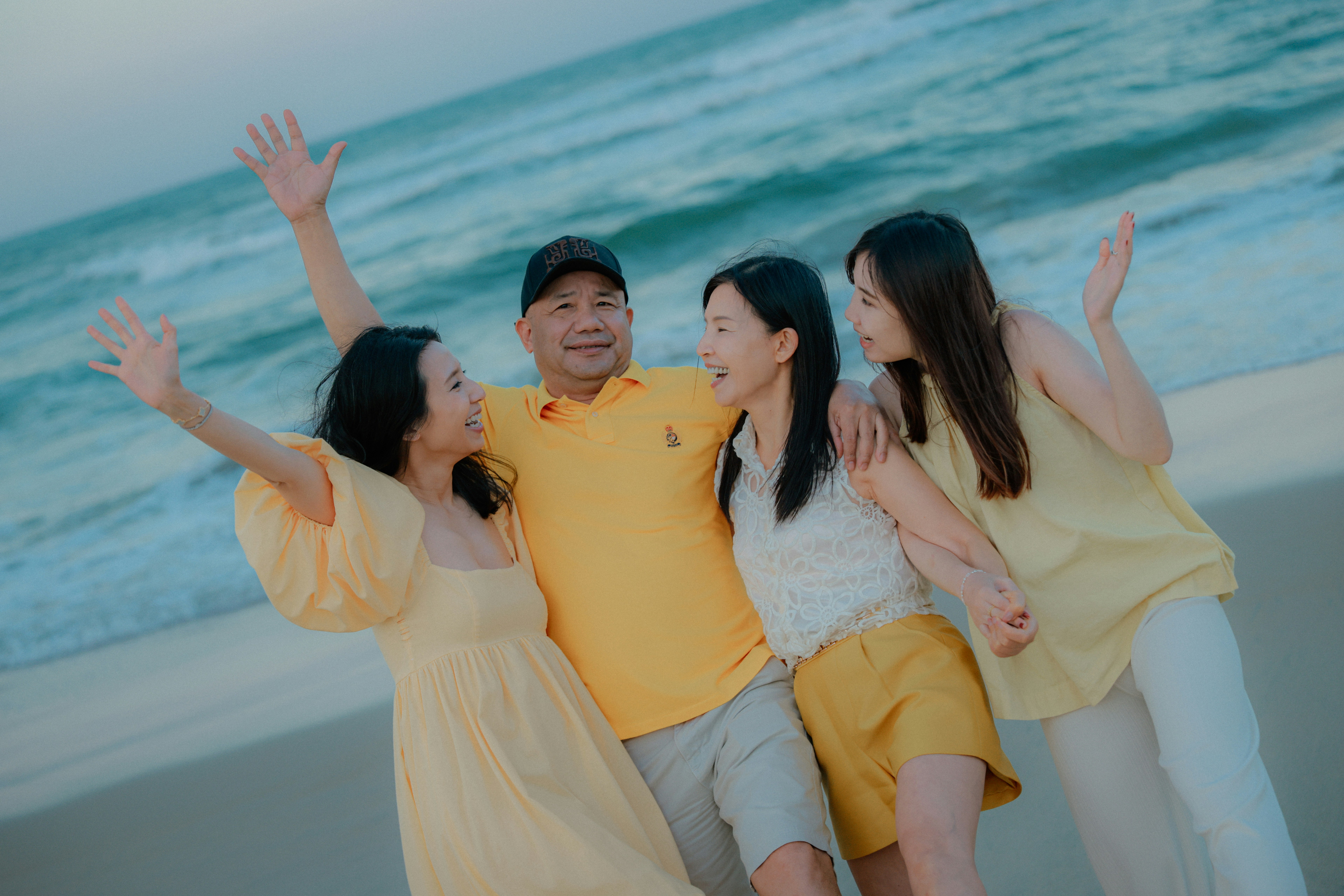 Joyful Beach Portrait: Four in Harmony by the Sea