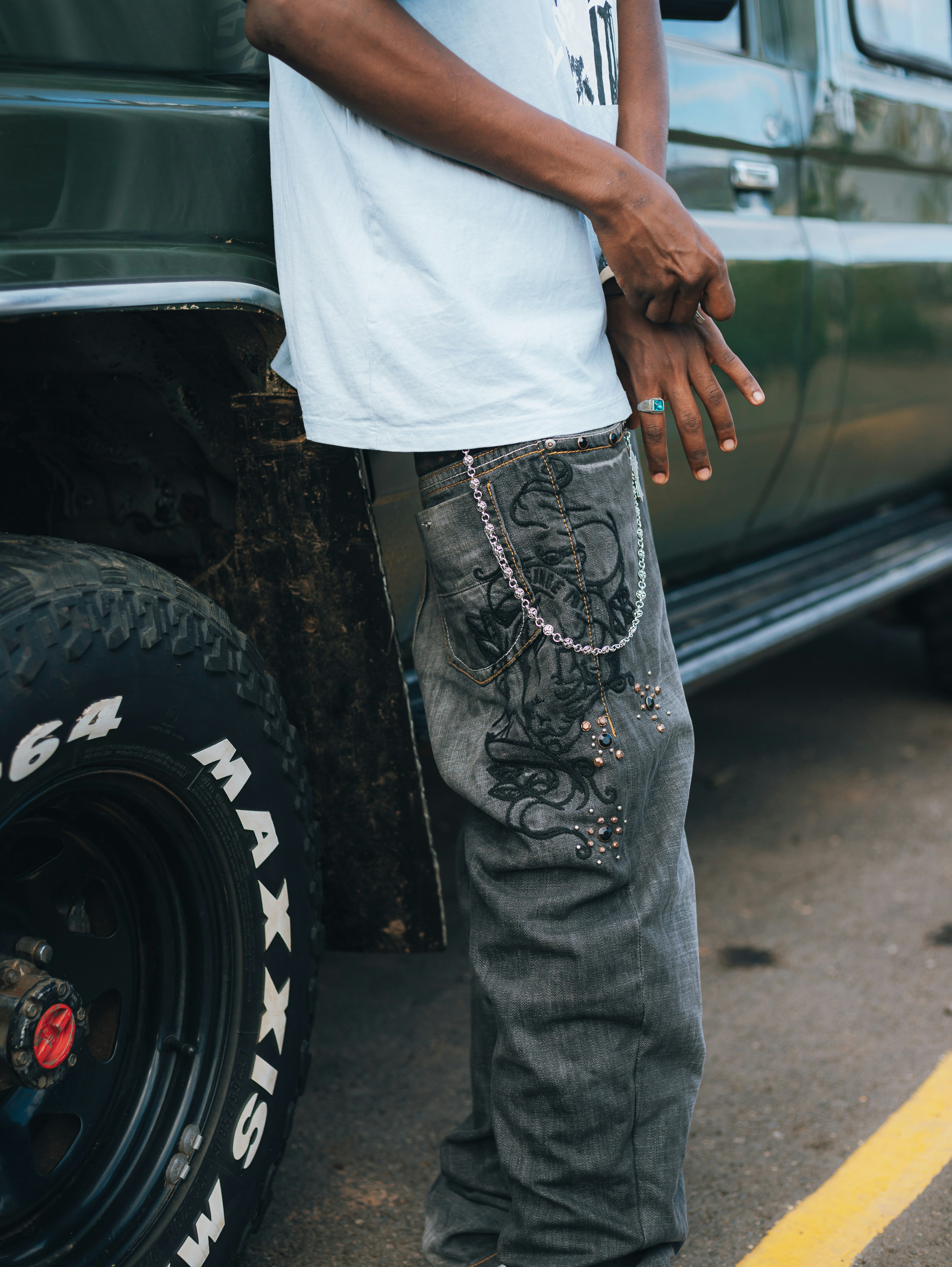 Midnight Denim and Mud: A Quiet Moment by the Truck