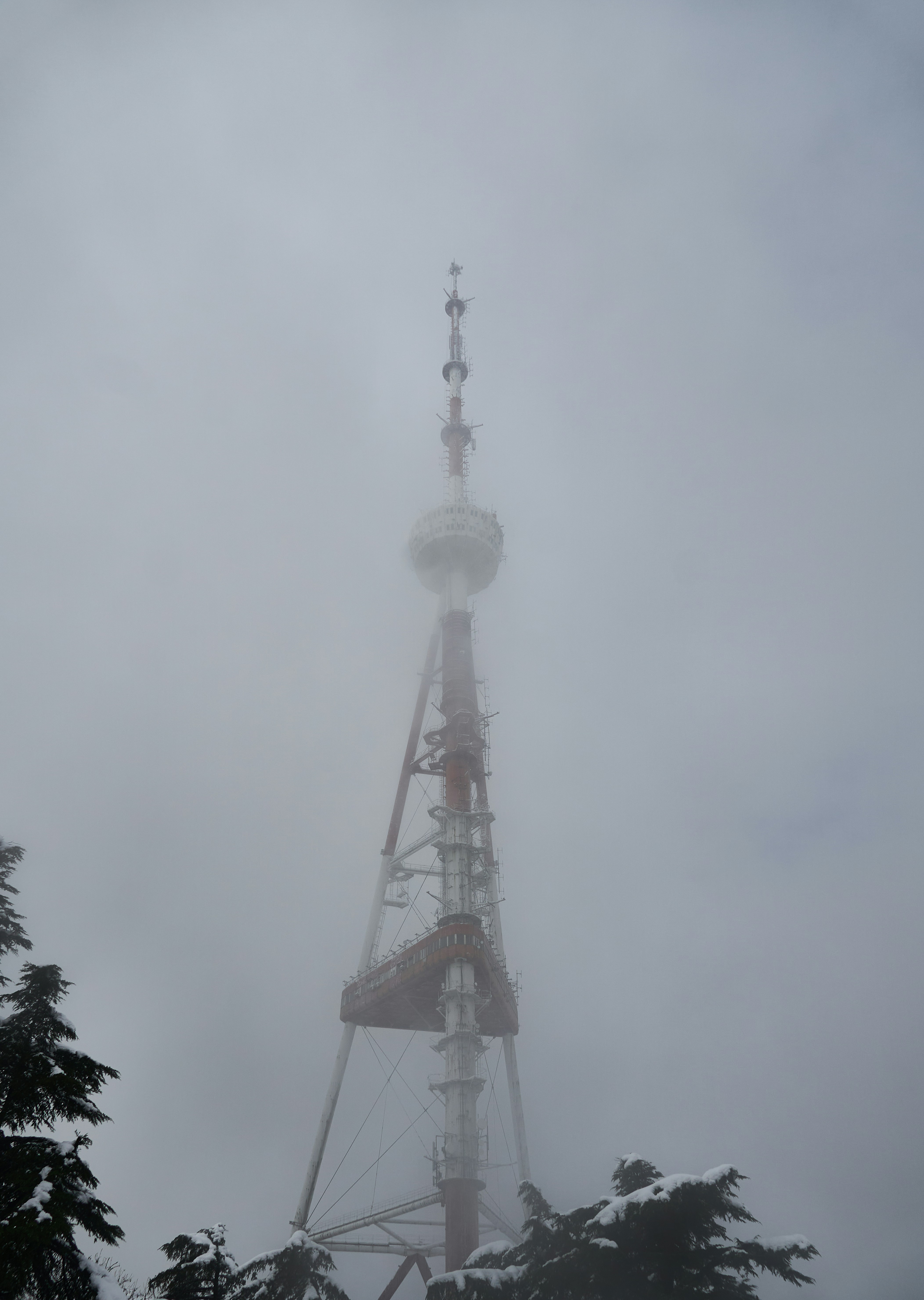 Misty Skyline: The Signal Tower Emerges Through Fog