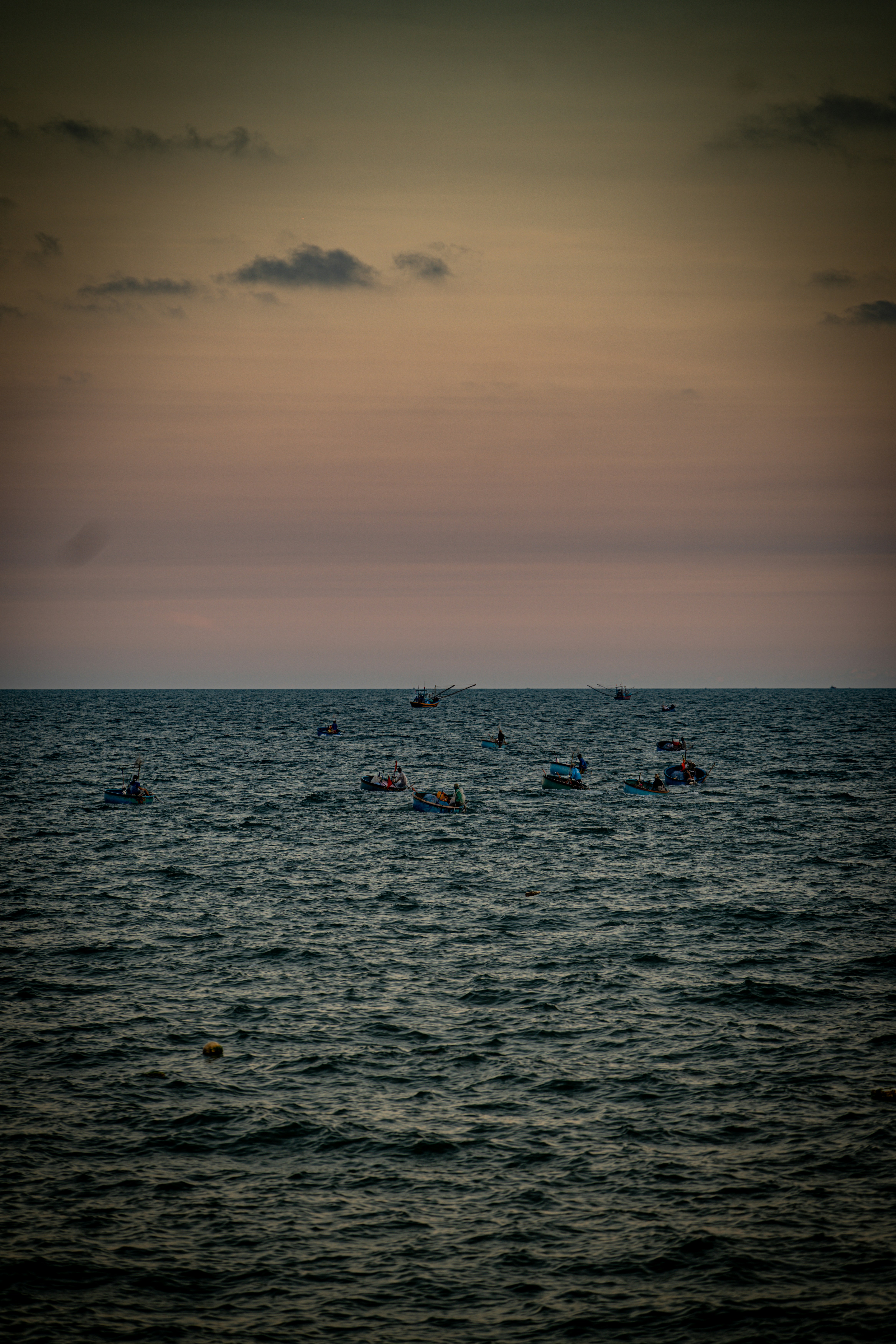 Boats Quietly Slice the Dusk-Soft Sea