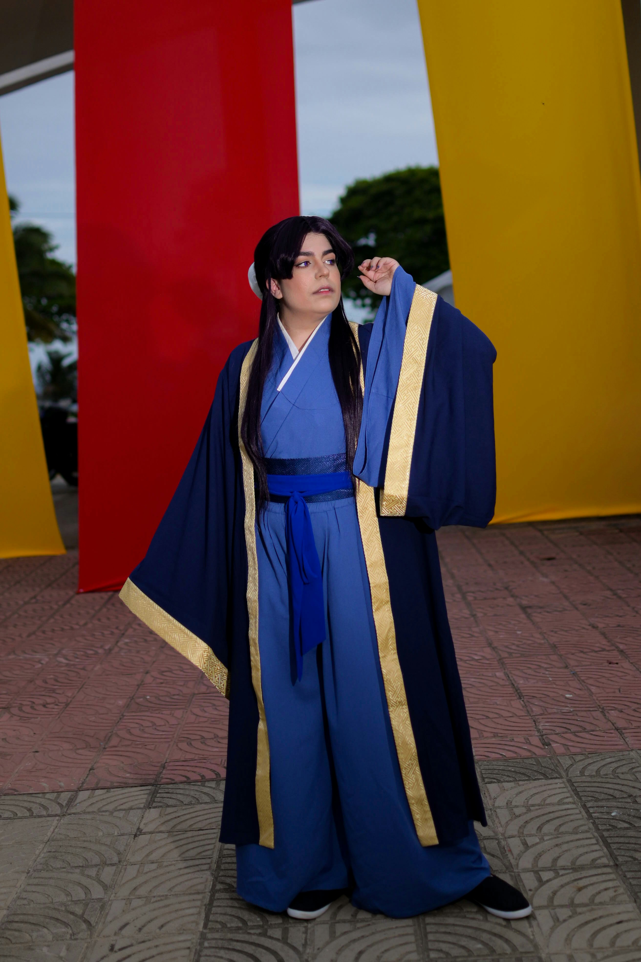 In Blue and Gold: A Portrait among Colorful Pillars