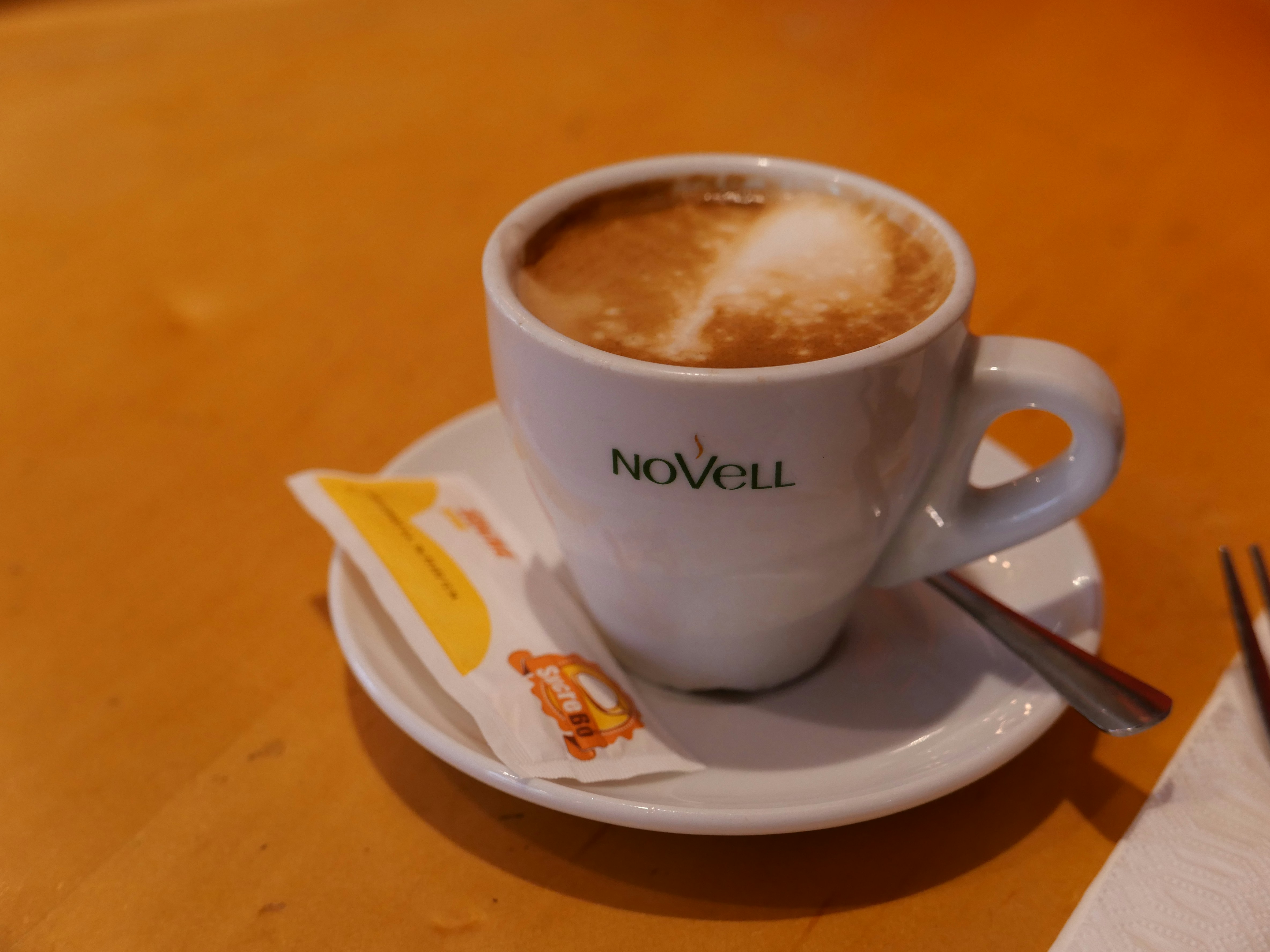 Quiet Espresso Moment on a Warm Café Table