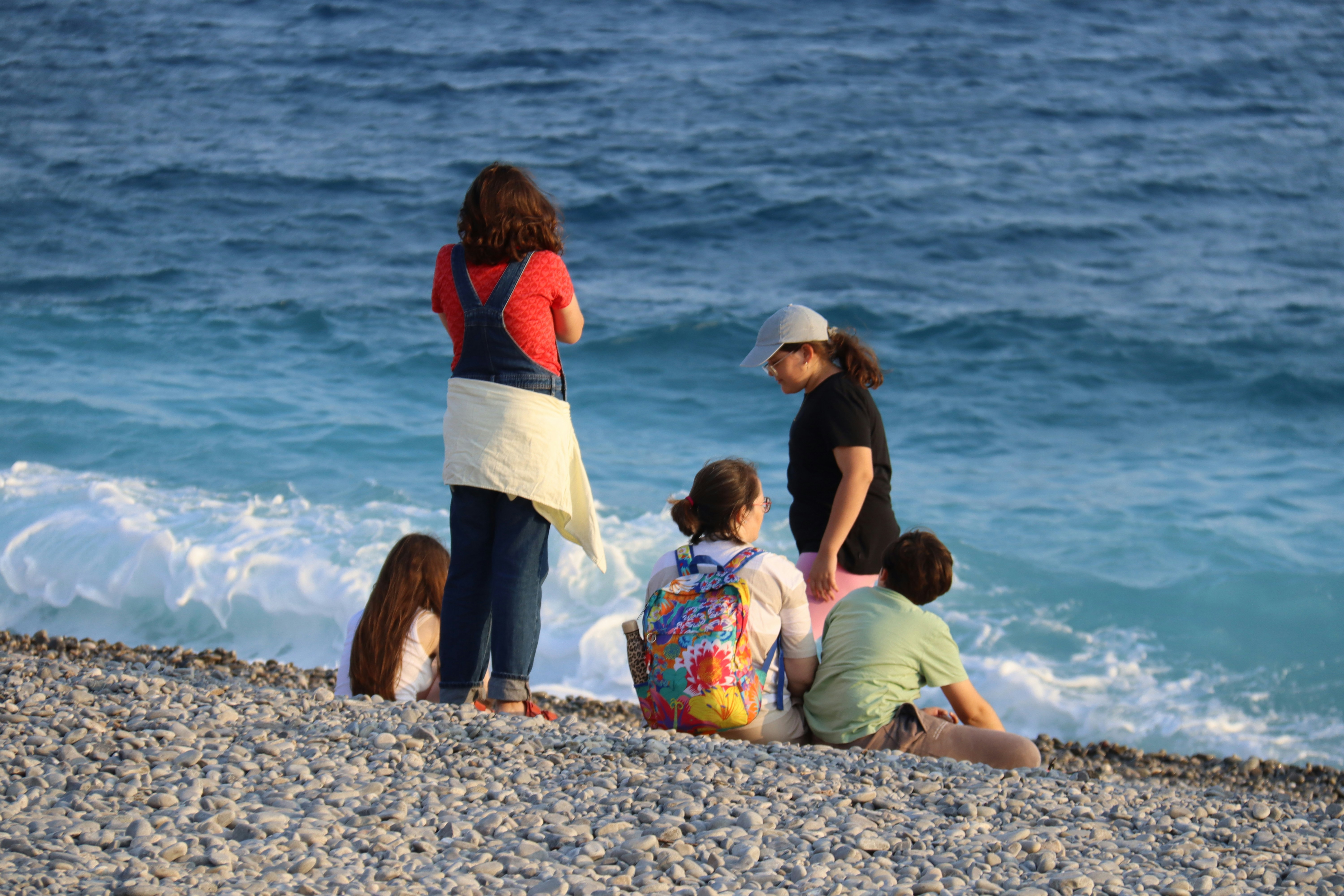 Seaside Circle: A Shoreline Moment Among Friends