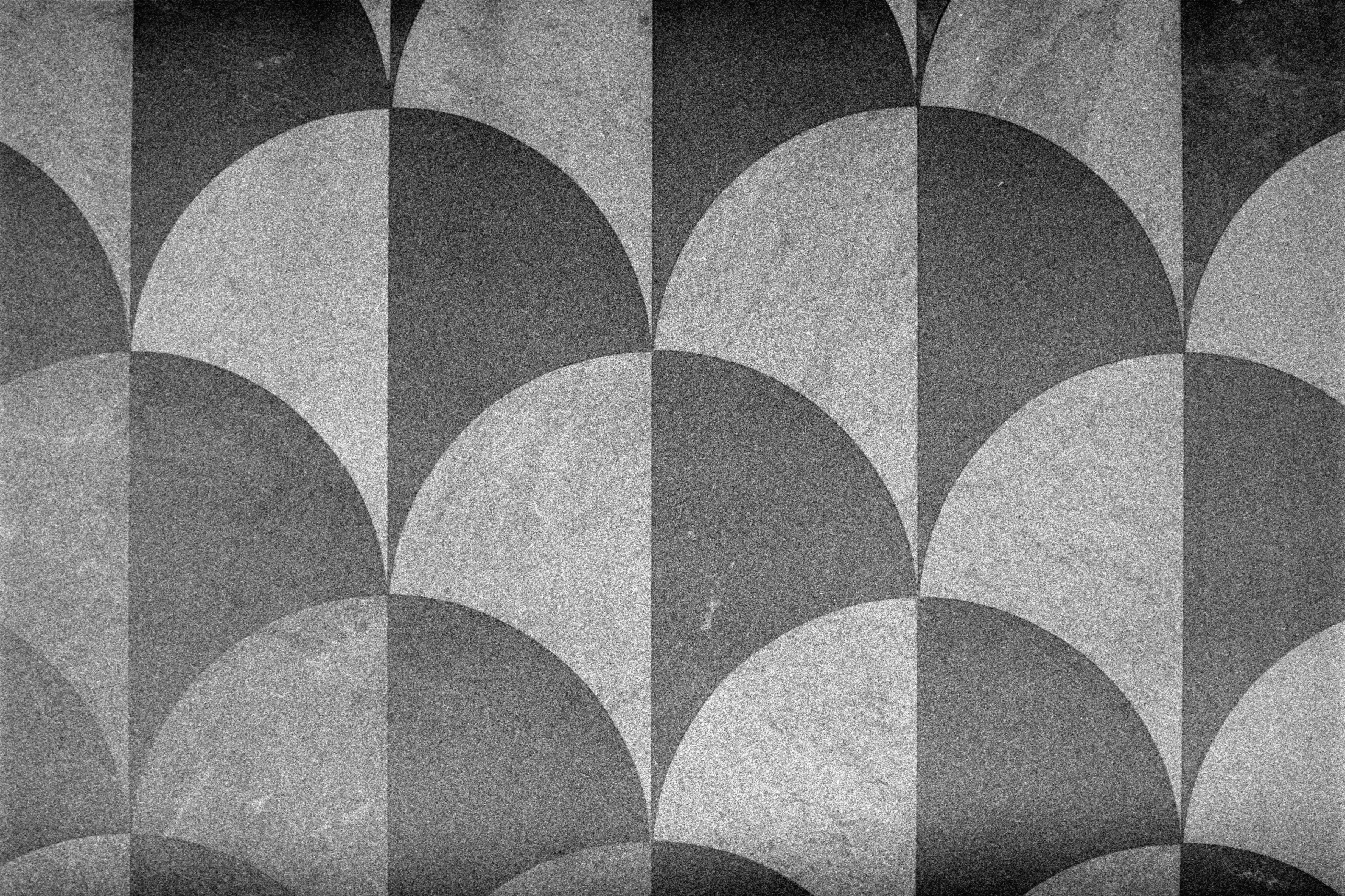 Geometric Curves: Interlocking Arches in Monochrome Rhythm