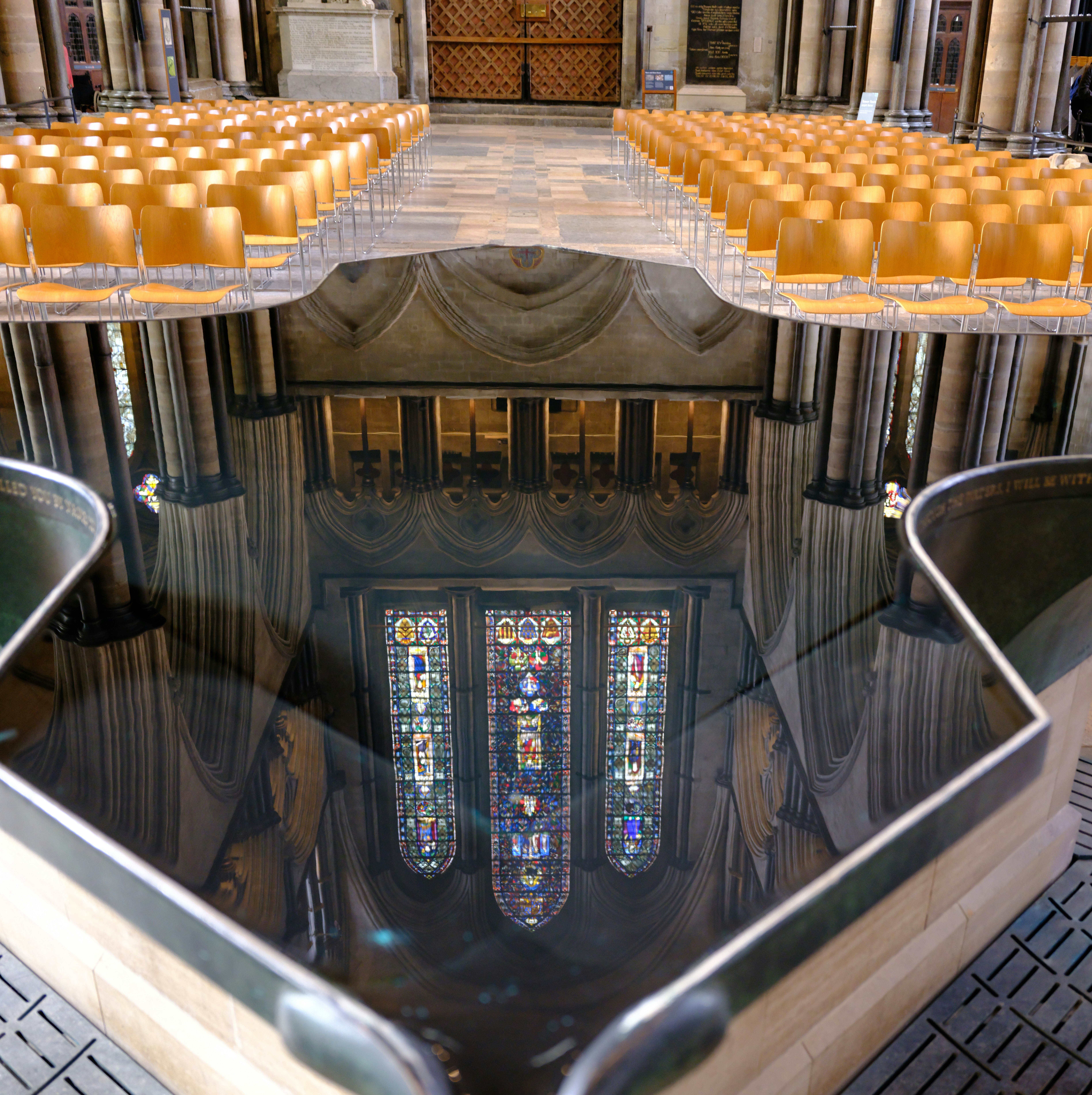Mirror of Stones: A reflecting nave beneath stained glass