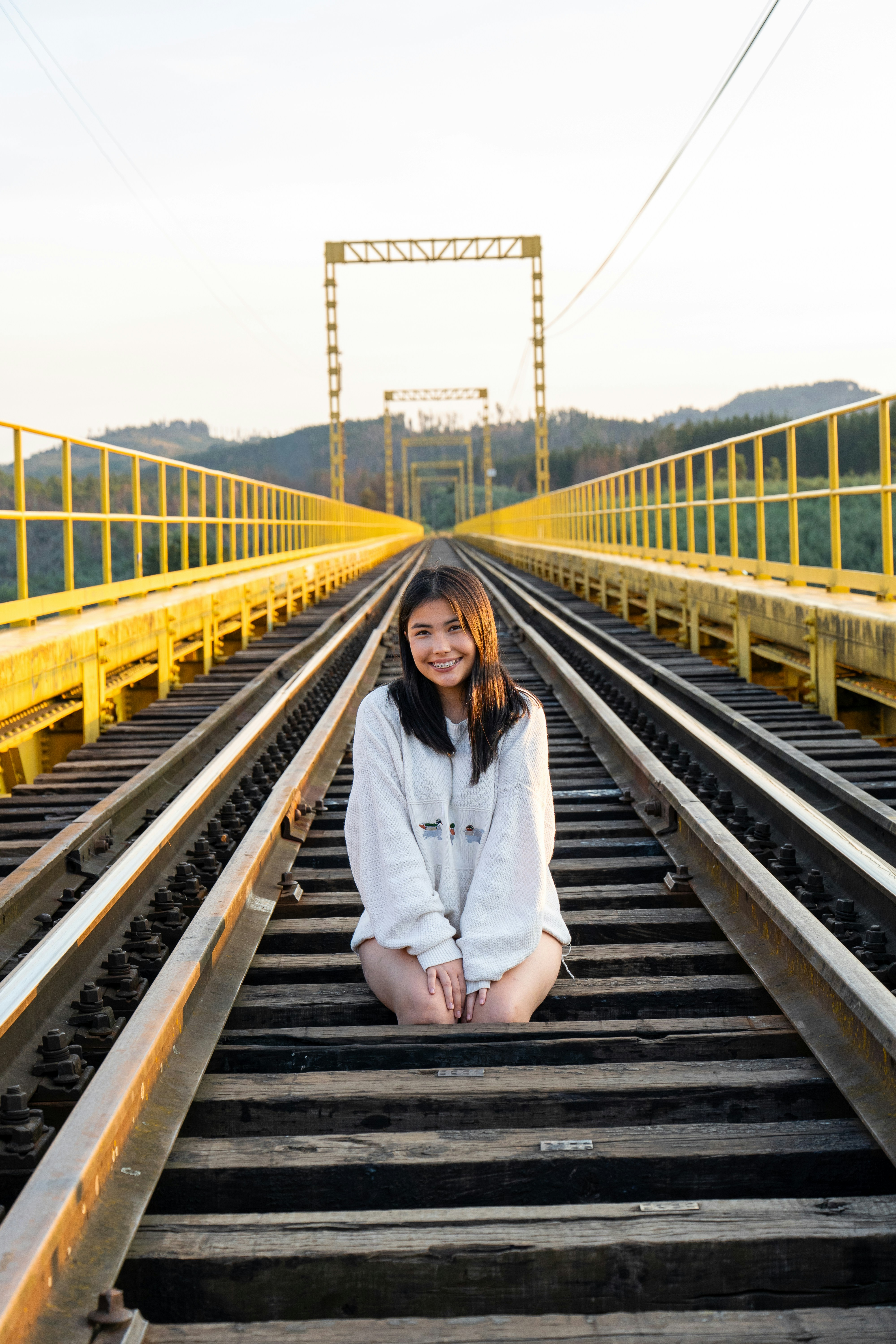 On the Rails: A Quiet Moment Amid Golden Tracks